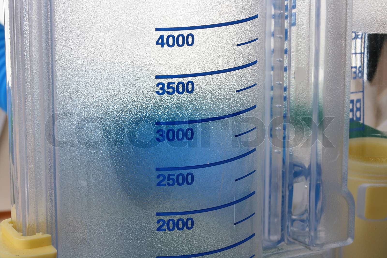 The plastic container with divisions for volume dimensions. | Stock ...
