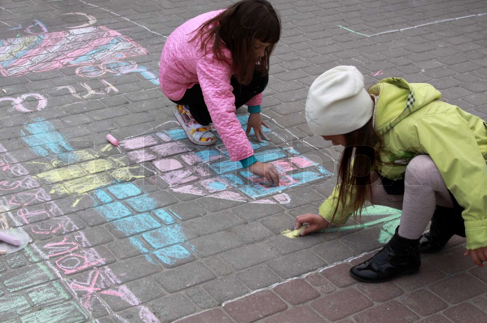 Children draw in the street | Stock image | Colourbox