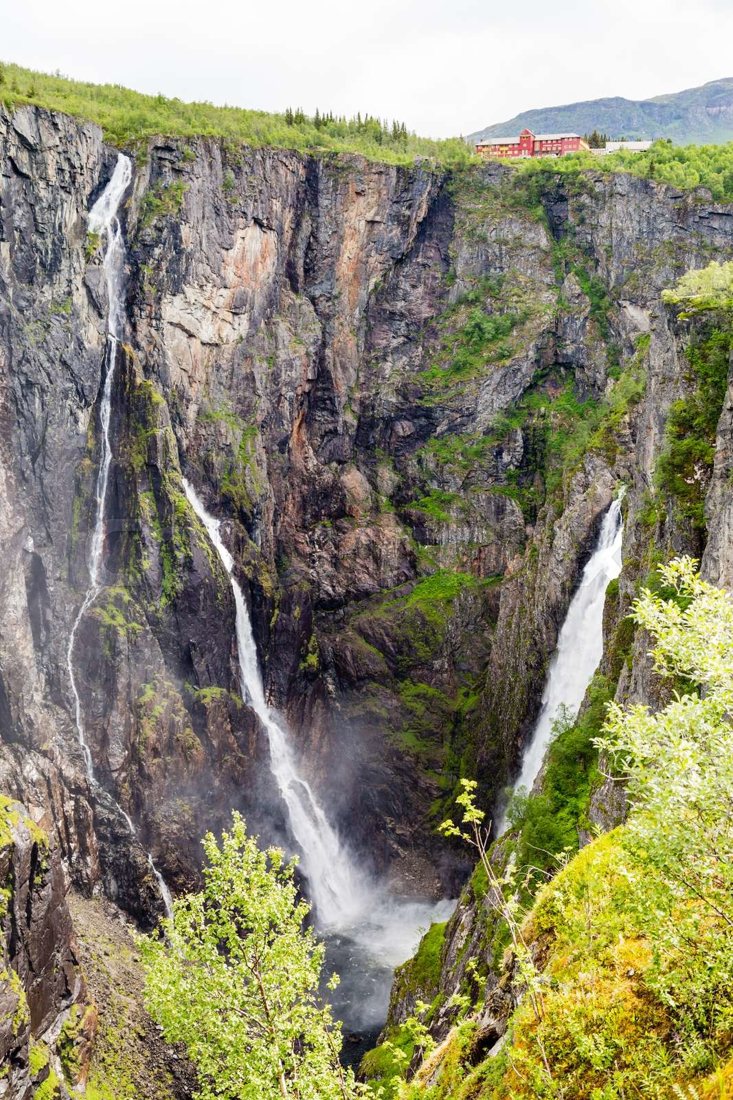 Fossli Hotel at the Voringsfossen waterfall in Norway | Stock image ...