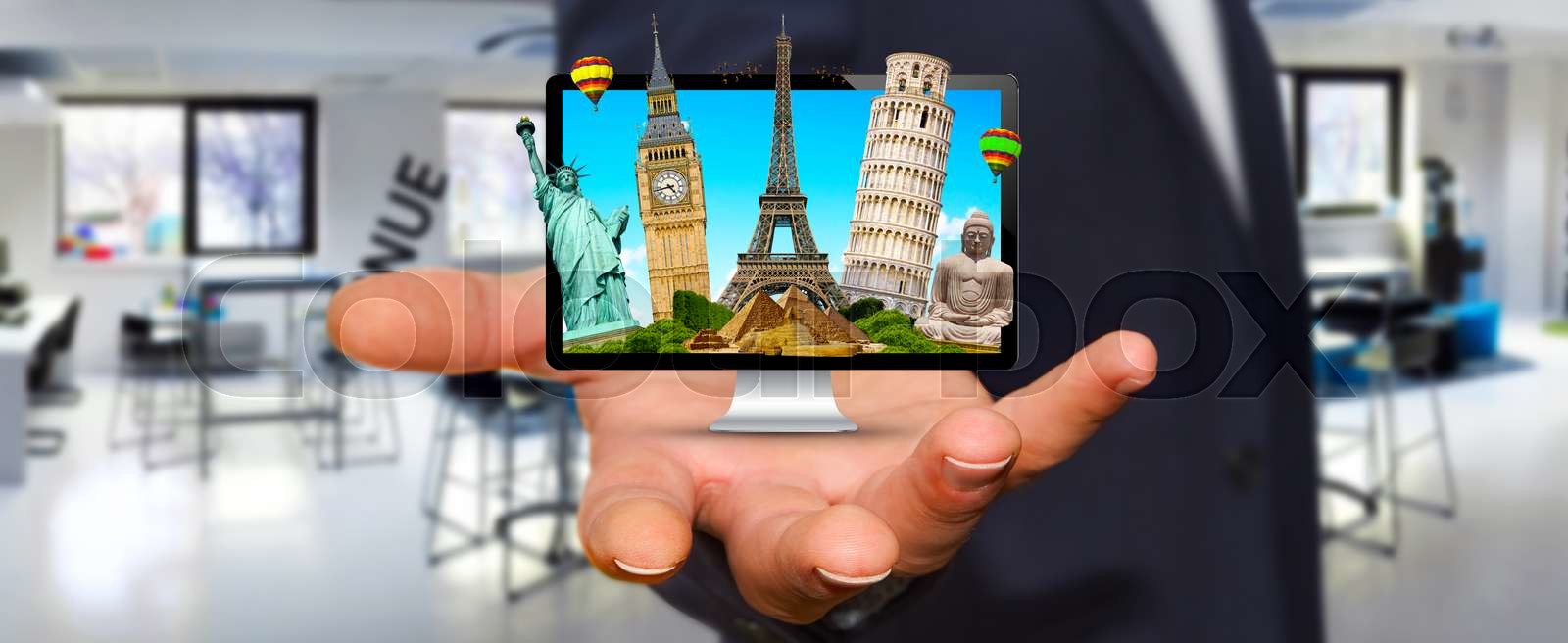 Man travelling the world with his computer | Stock image | Colourbox