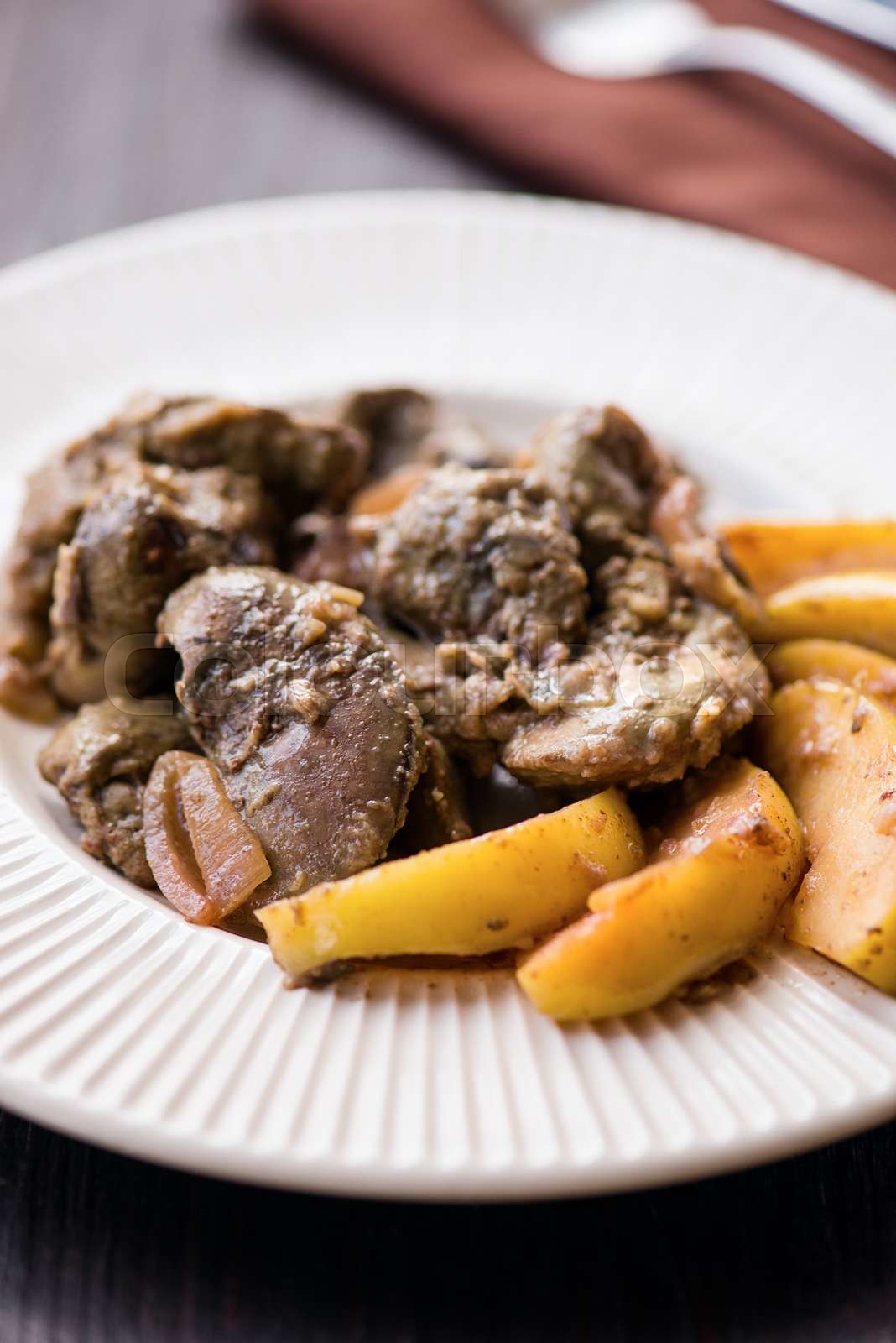 Stir-fried chicken kidney with apples | Stock image | Colourbox