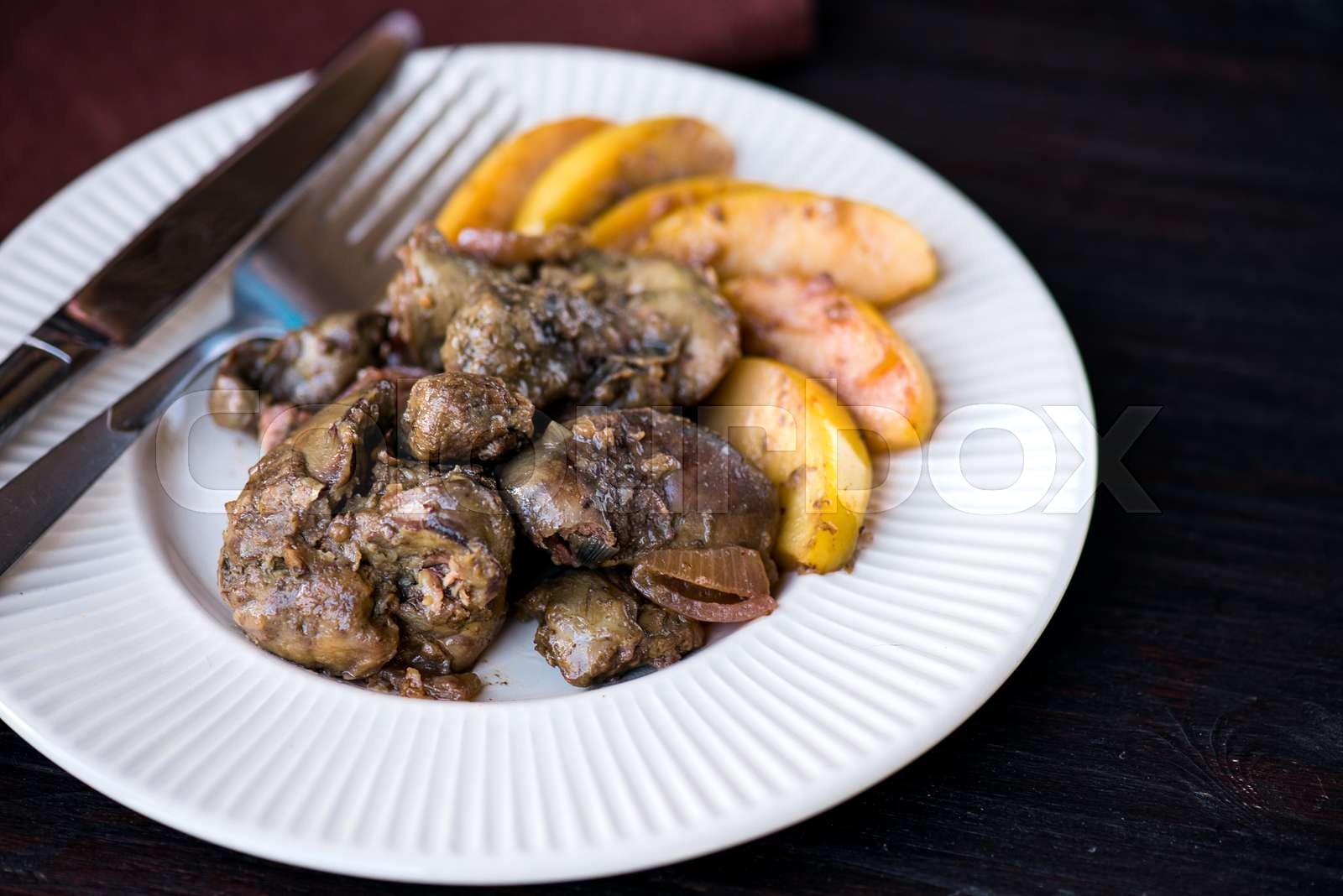 Stir-fried chicken kidney with apples | Stock image | Colourbox