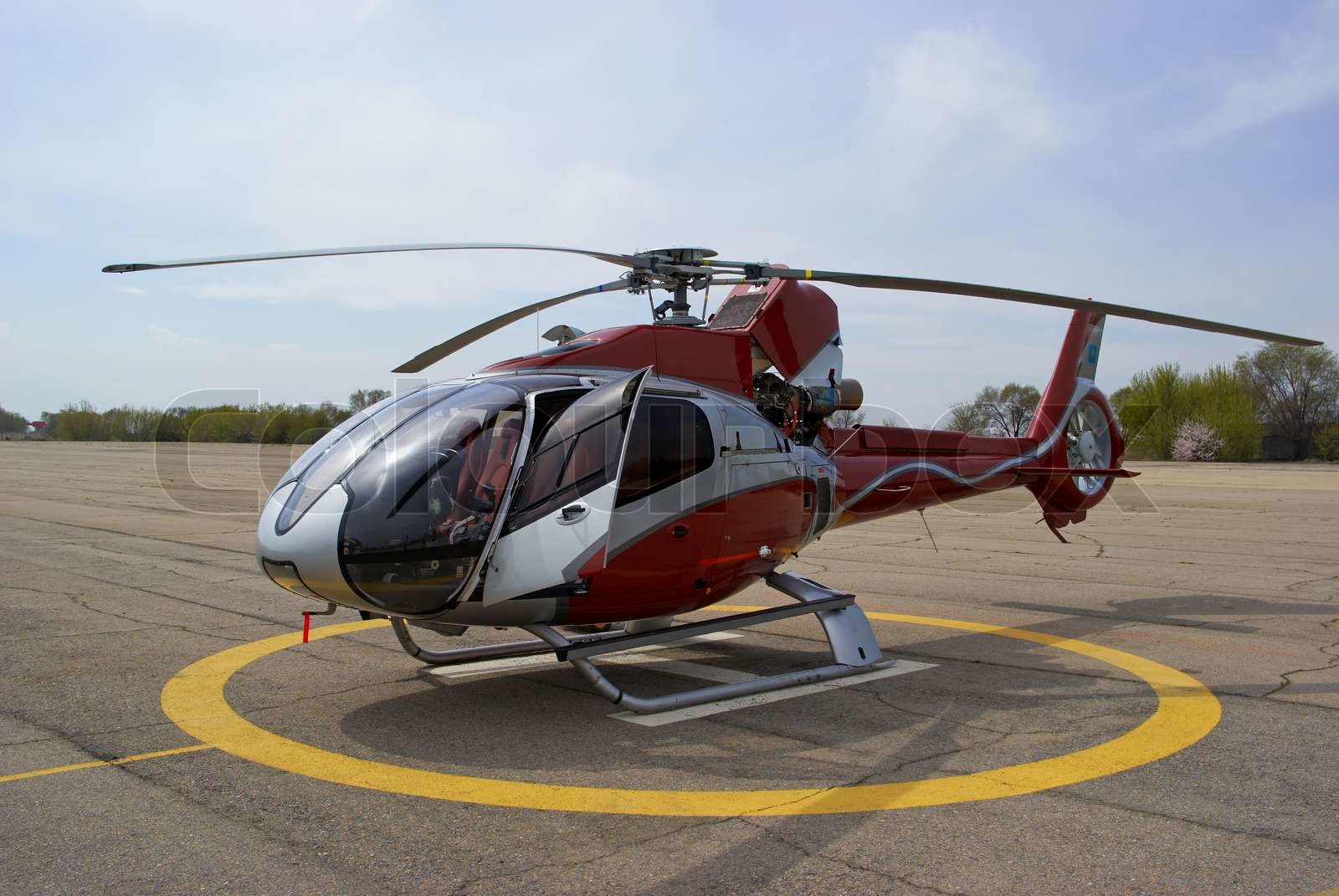 Helicopter at take-off site with open door | Stock image | Colourbox