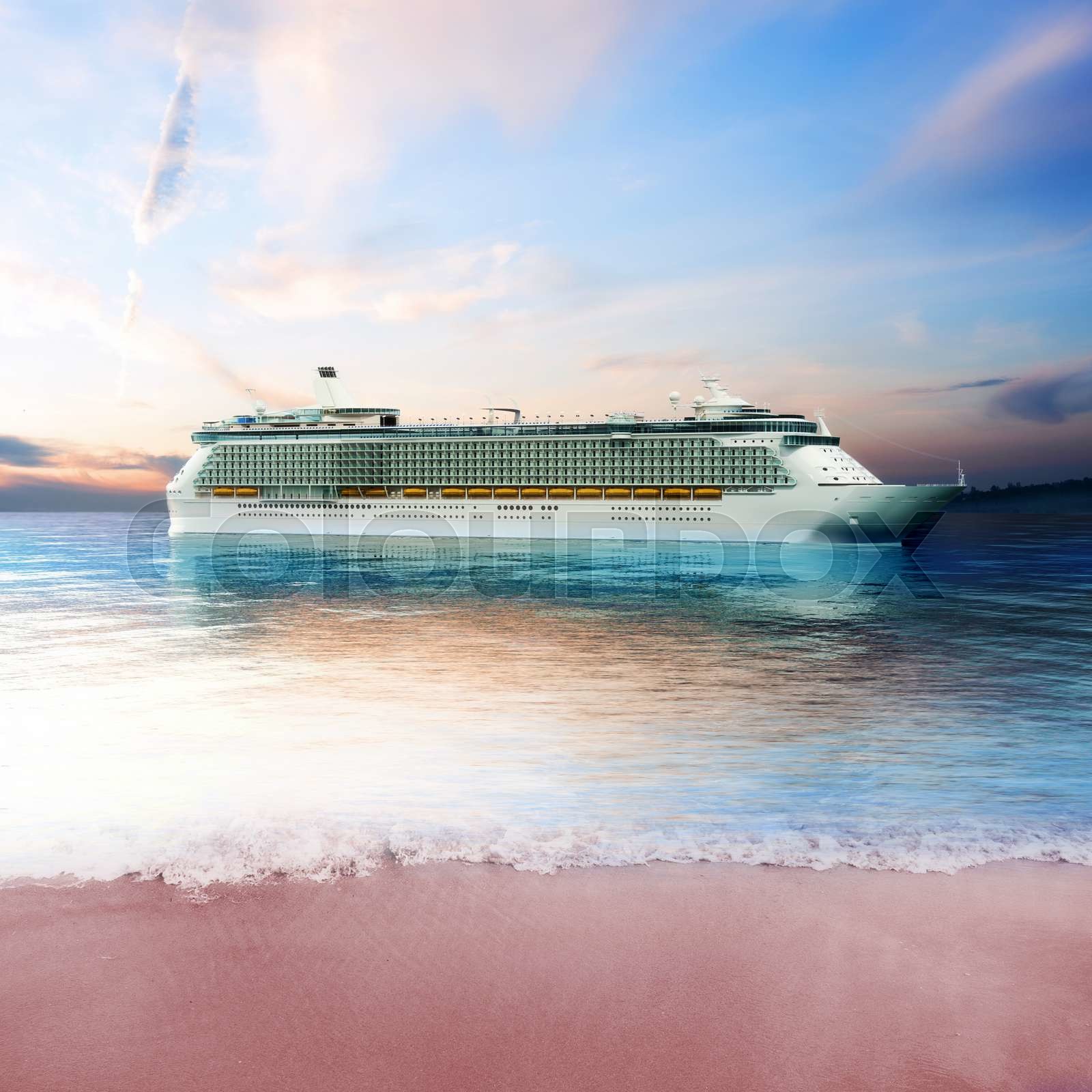 Cruise ship just off the coast of an island with tranquil view | Stock ...
