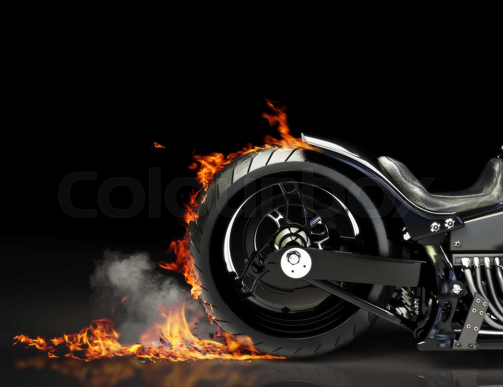 Motorcycle burnout, hot motorcycle with fire. | Stock image | Colourbox