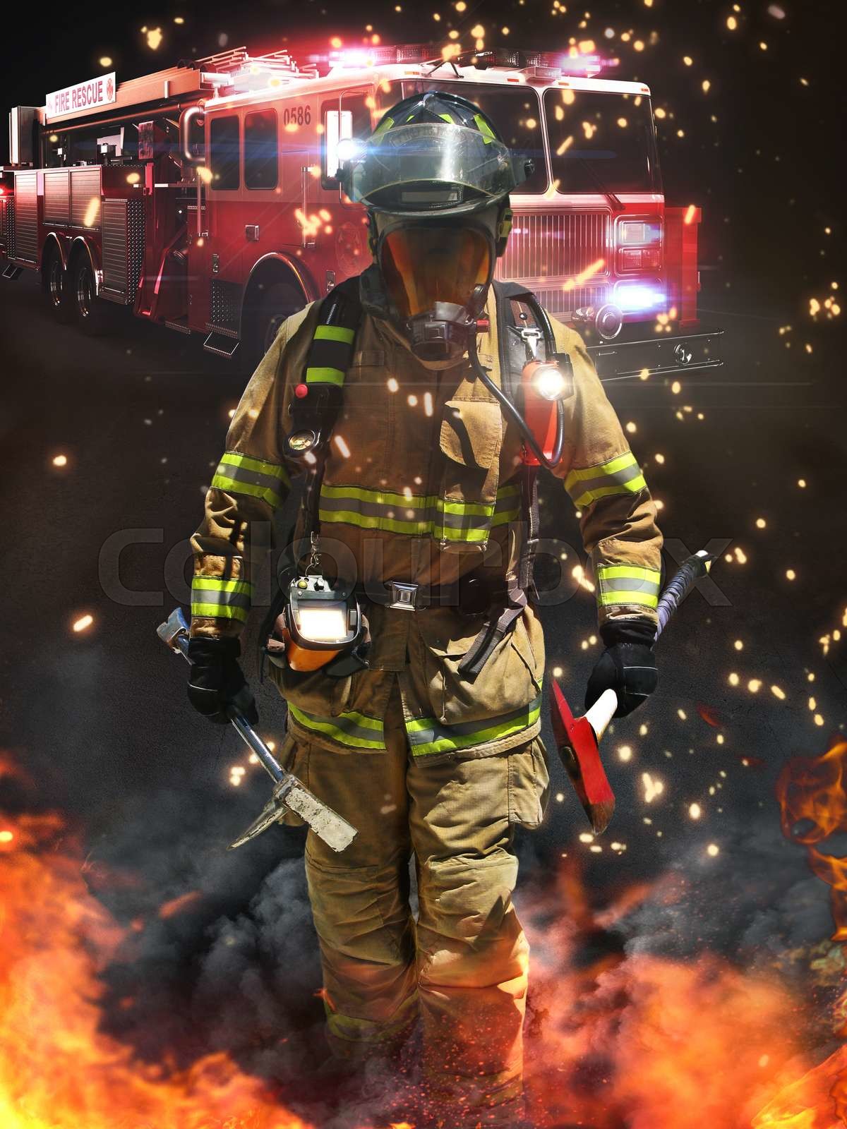 Firefighter going into the fire. | Stock image | Colourbox