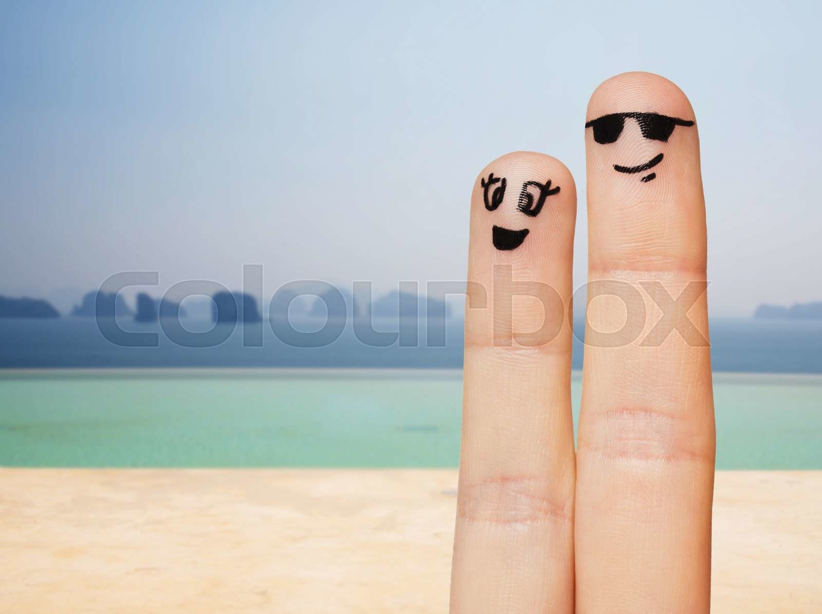 close up of two fingers with smiley faces | Stock image | Colourbox