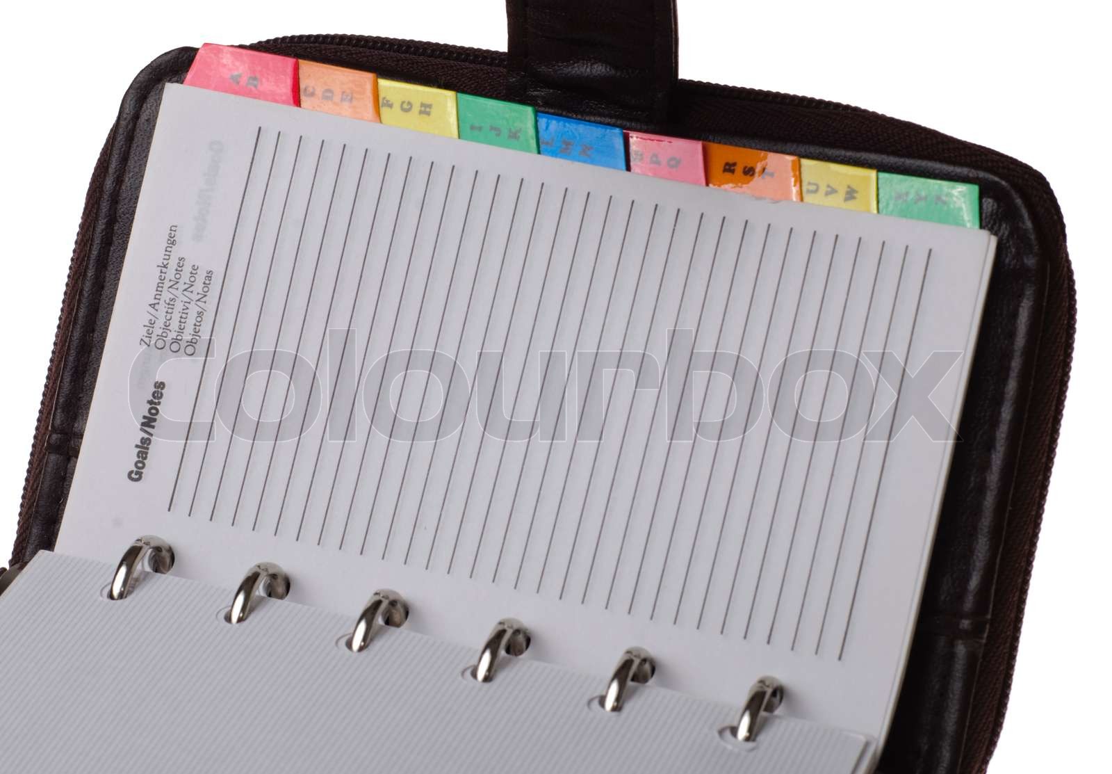 Dagbog og telefonbogen i læder , isoleret på hvidt | Stock foto | Colourbox