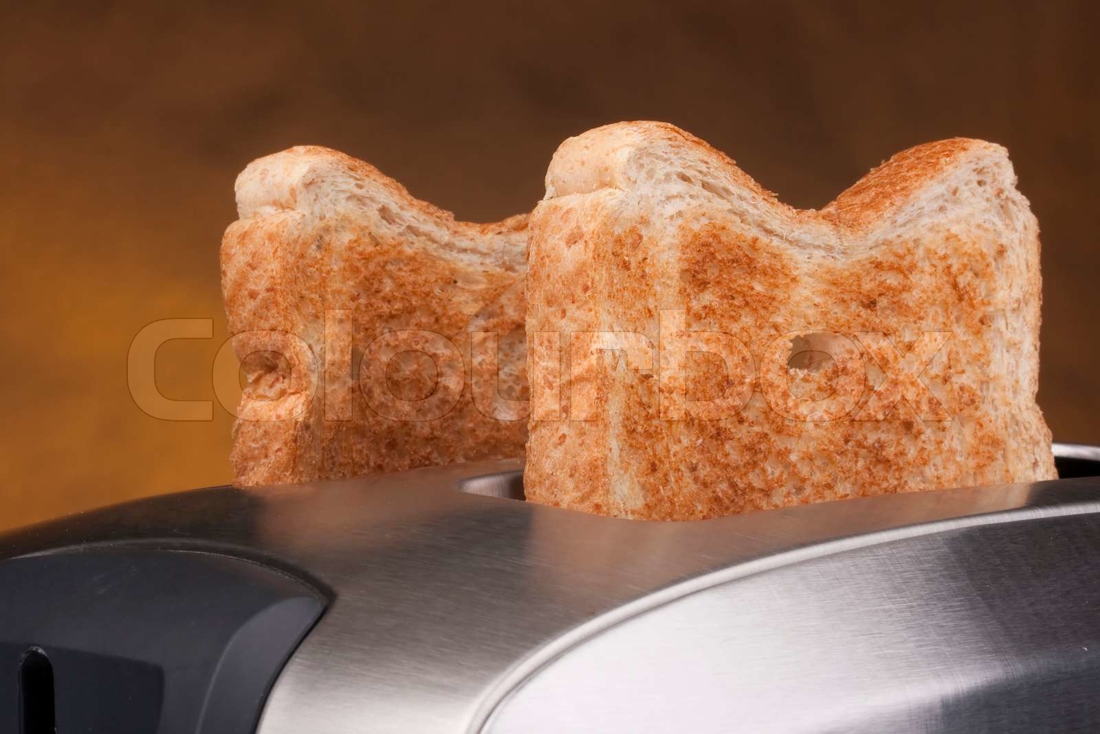 A toaster and a special bread for toast. | Stock image | Colourbox