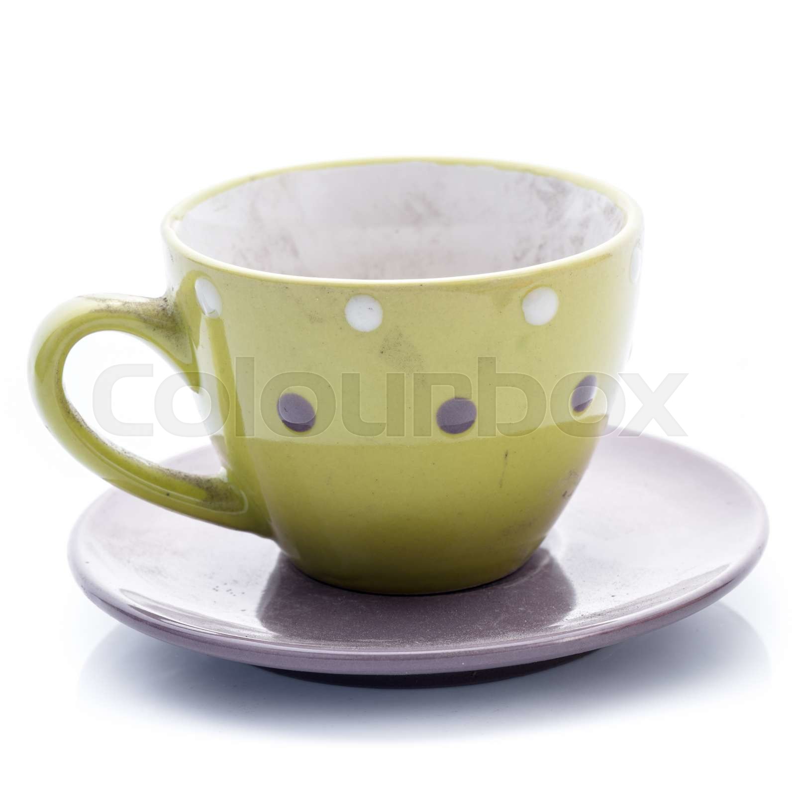 Dirty coffee cup with dust isolated on white | Stock image | Colourbox