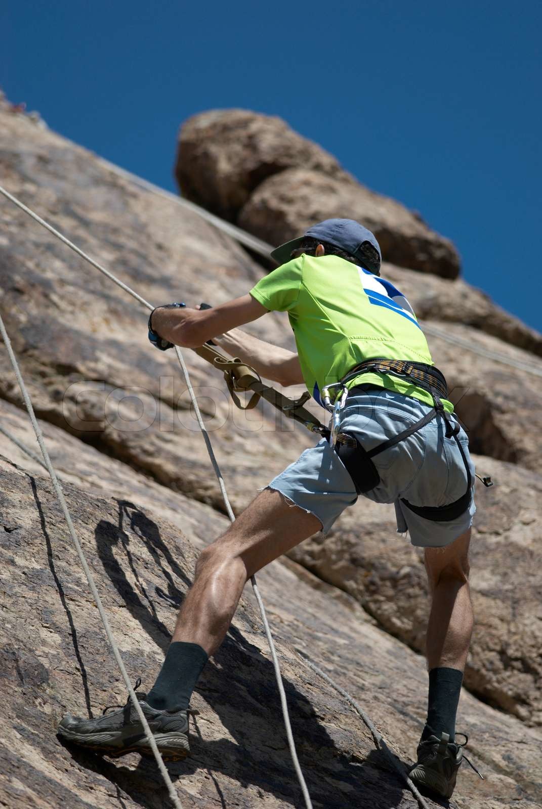Clamber on cliff | Stock image | Colourbox