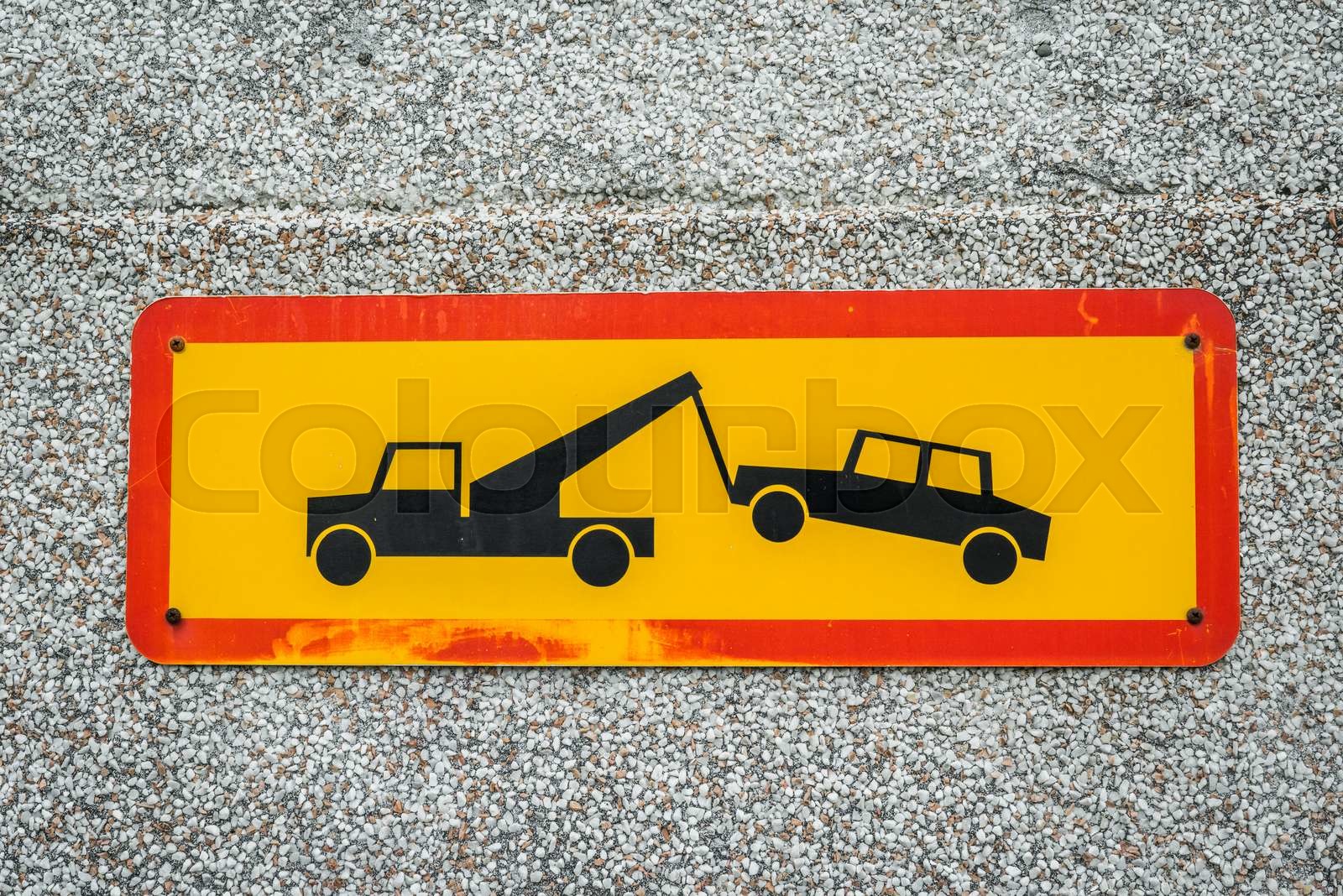 Car removal sign on a wall | Stock image | Colourbox
