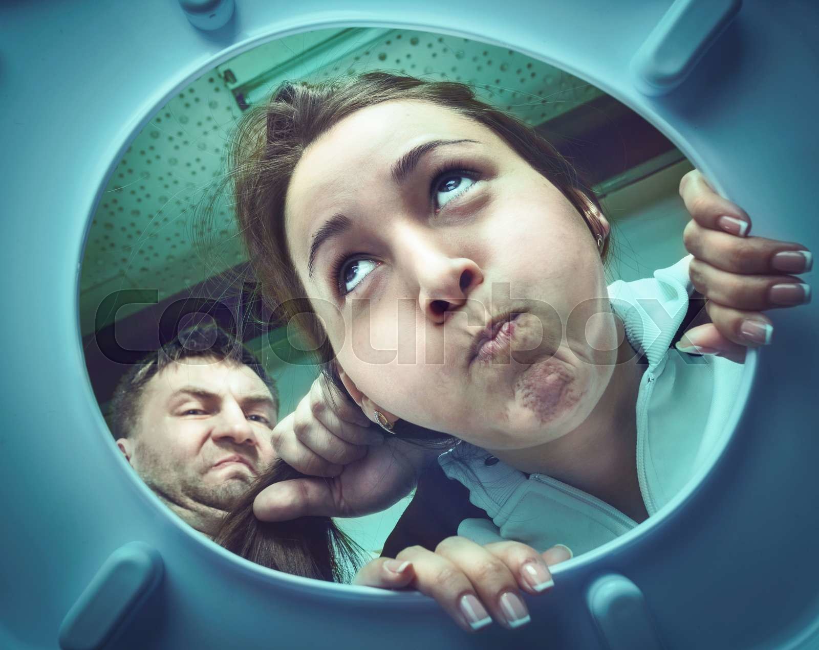 Woman ready to puke in the toilet bowl | Stock image | Colourbox