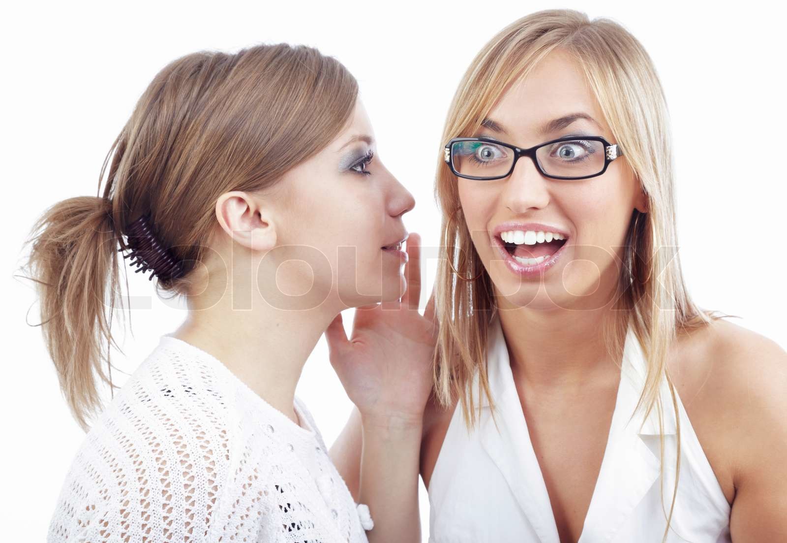 Two friends talking something secret | Stock image | Colourbox