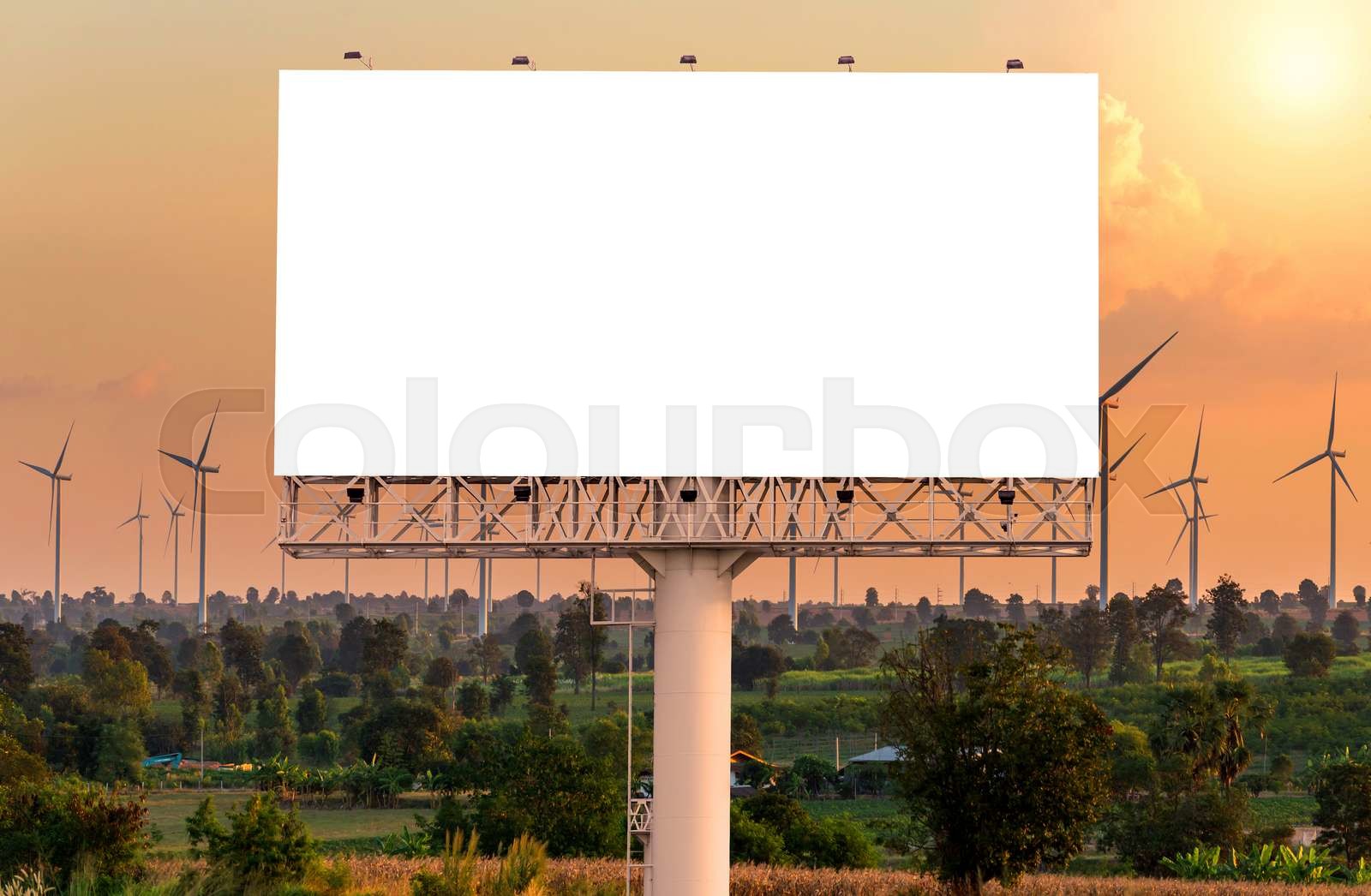 Blank billboard for advertisement at Eco power in wind turbine farm ...