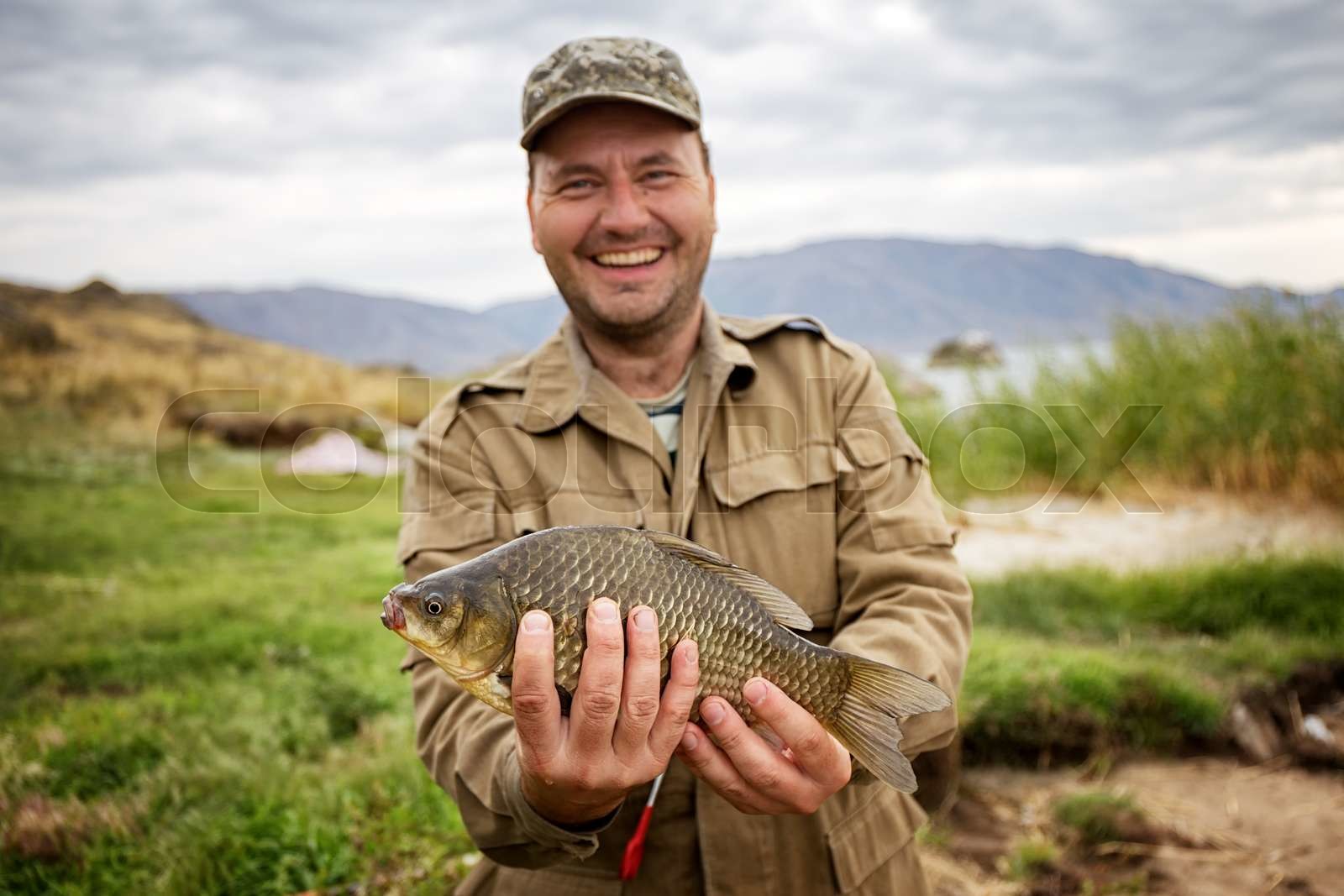 Fishing fan on lake | Stock image | Colourbox