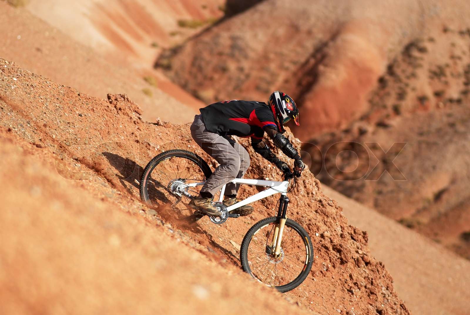 Extreme downhill in red canyon | Stock image | Colourbox