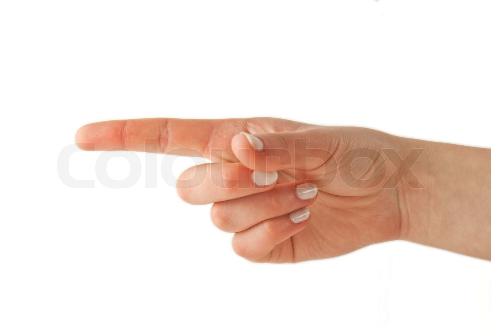 Woman gesturing direction with her hand | Stock image | Colourbox