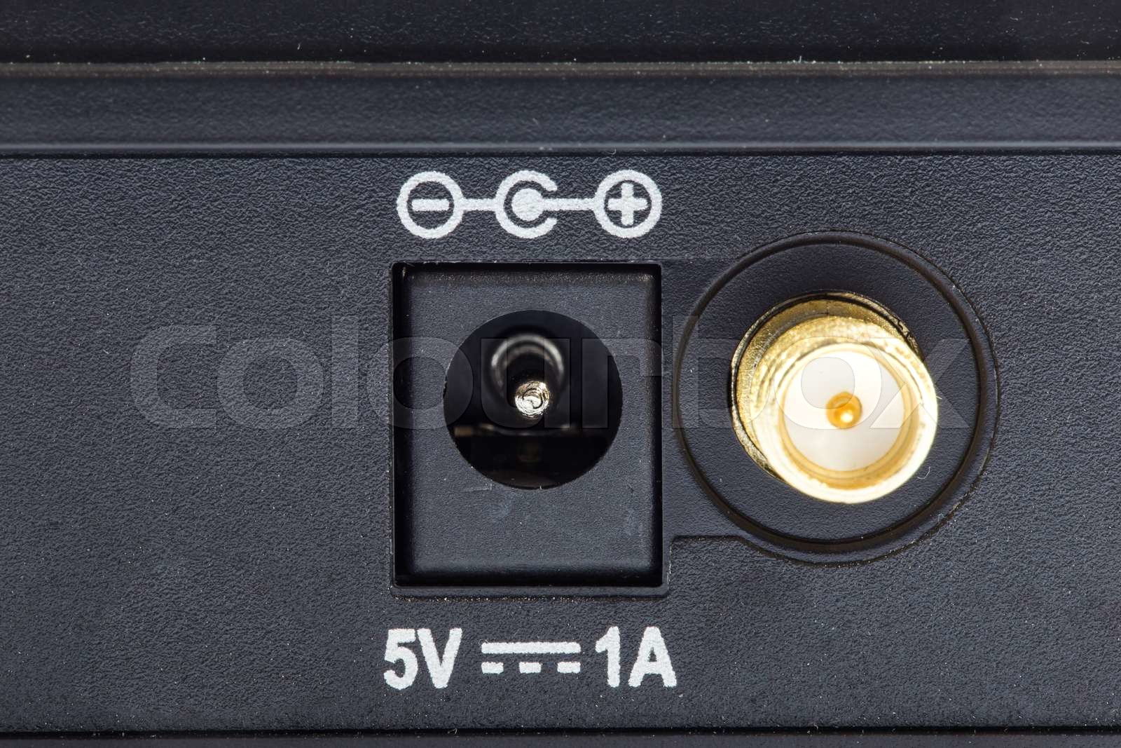 Power port of black access point router | Stock image | Colourbox