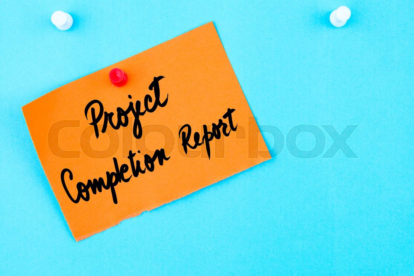 Project Completion Report written on orange paper note | Stock image ...