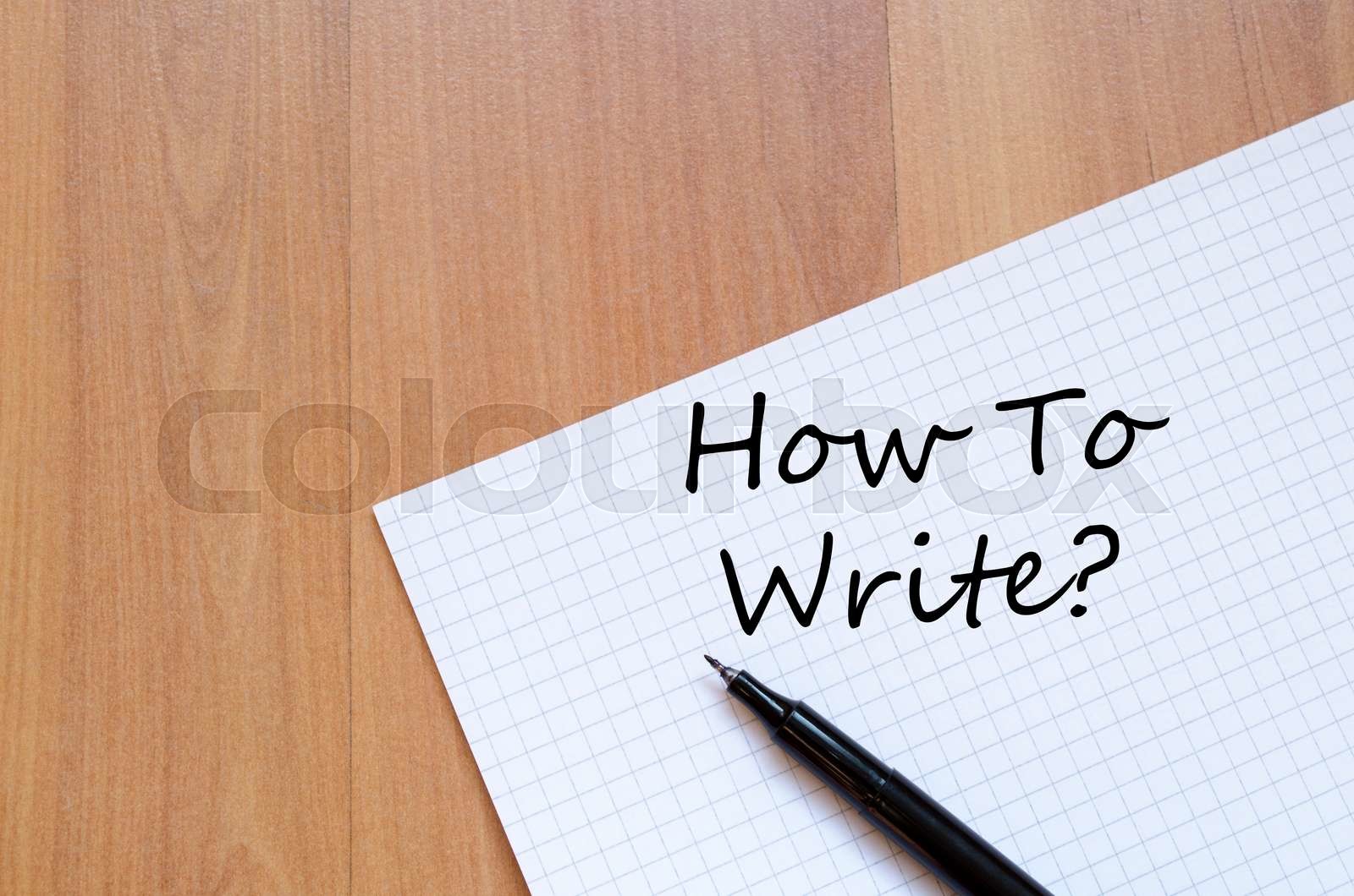 How to write write on notebook | Stock image | Colourbox