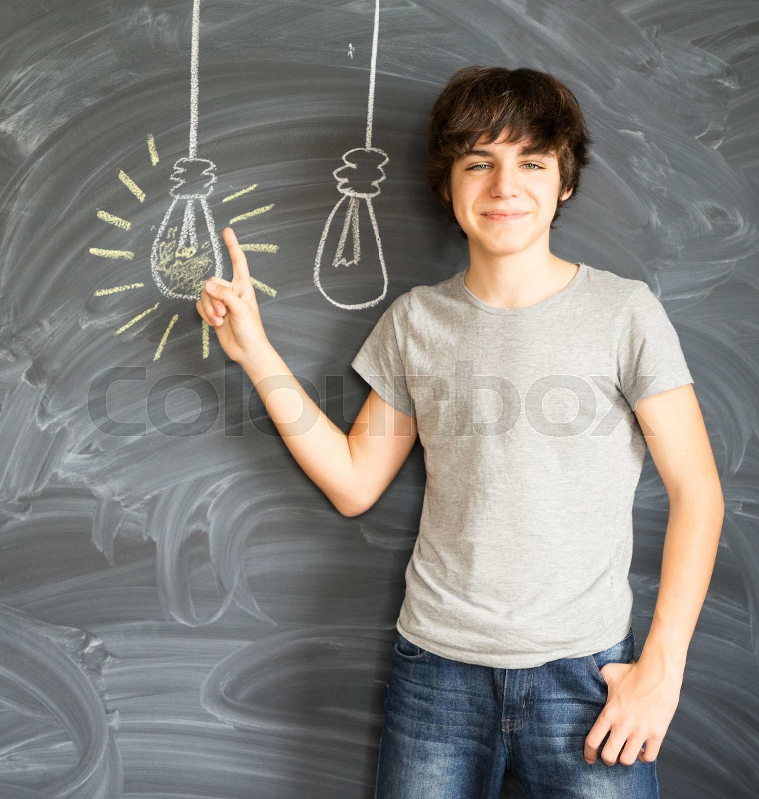 Teenager boy getting an idea | Stock image | Colourbox