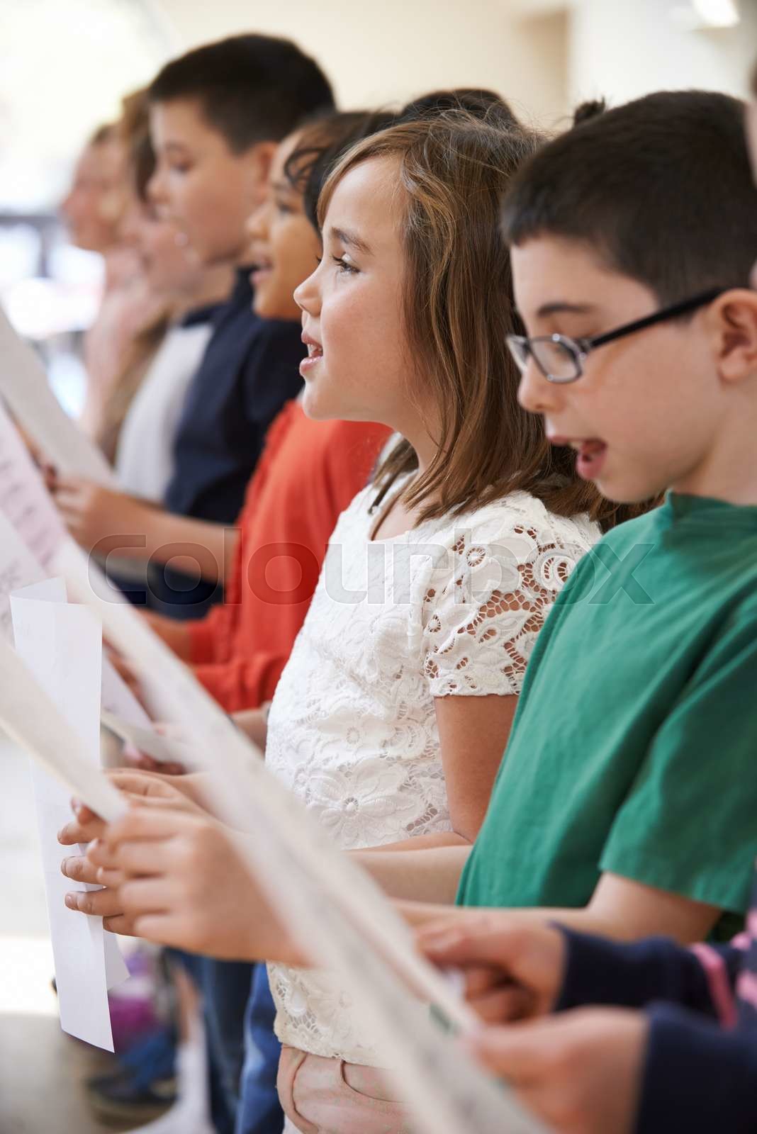 Group Of School Children Singing In Choir Together | Stock image ...