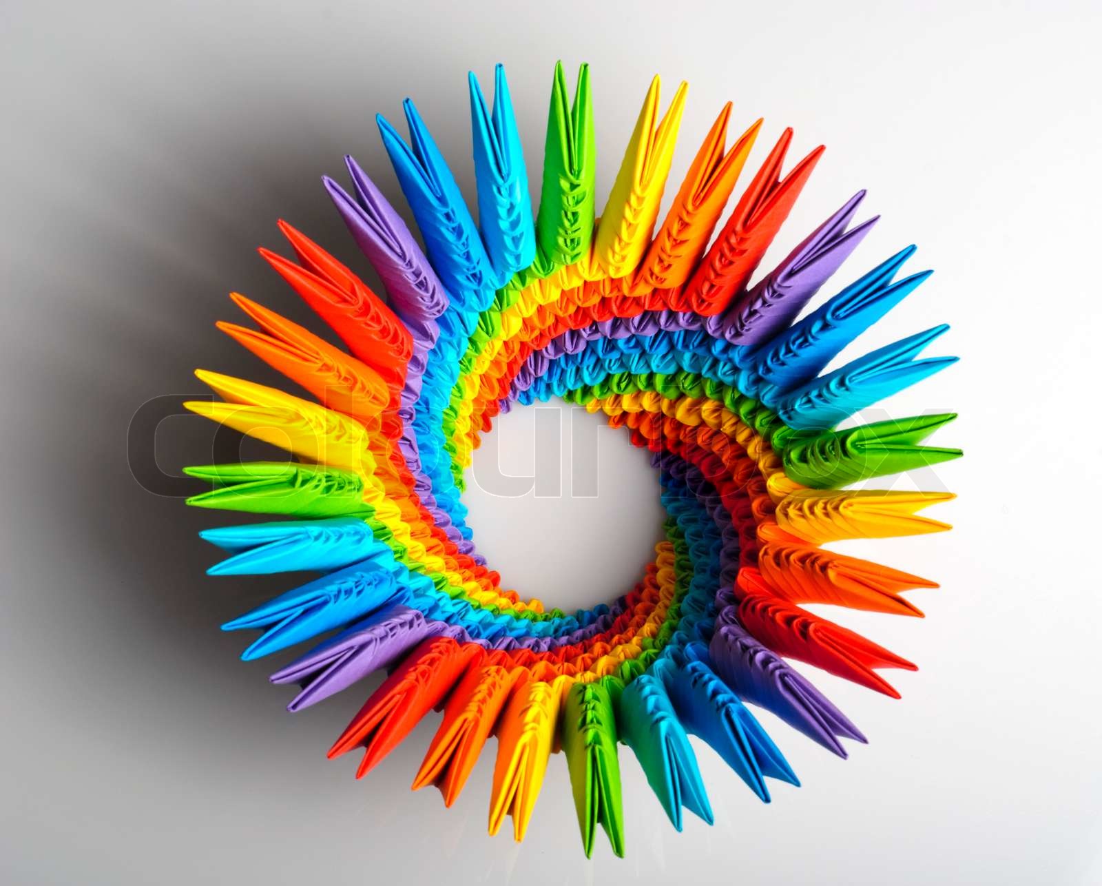 Colorfull origami 3d units like a rainbow circle isolated on white with ...
