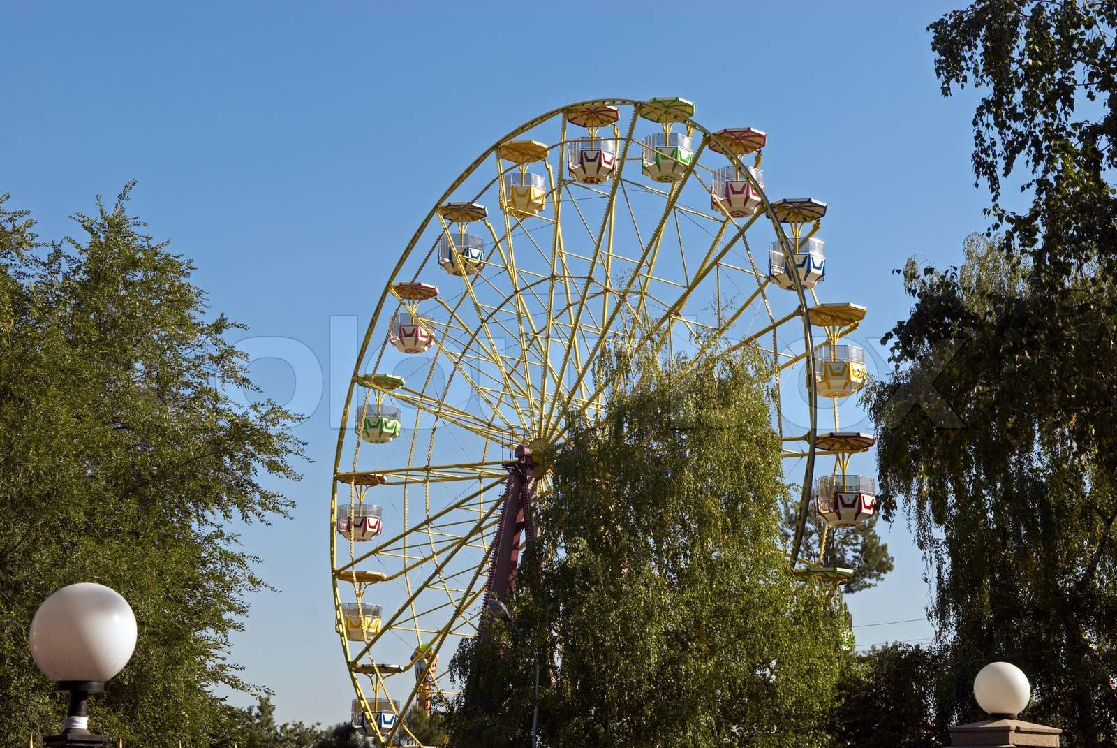 Yellow Ferris Wheel | Stock image | Colourbox