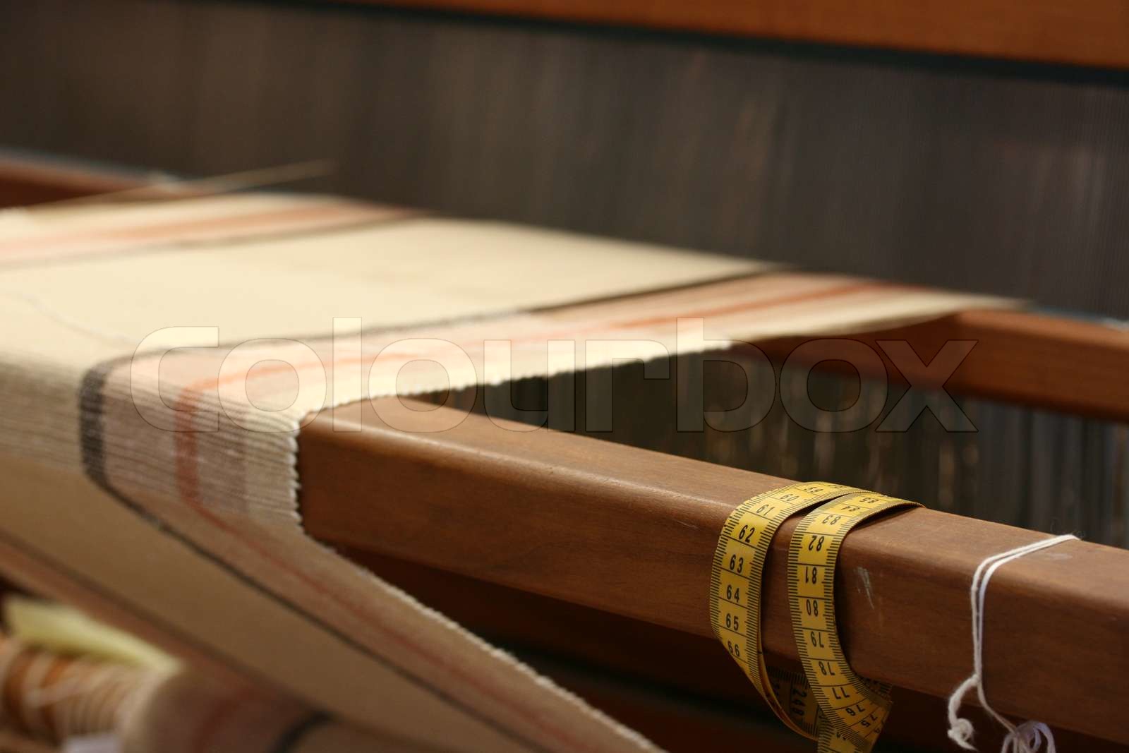 Ancient weaving loom with a product in work. | Stock image | Colourbox