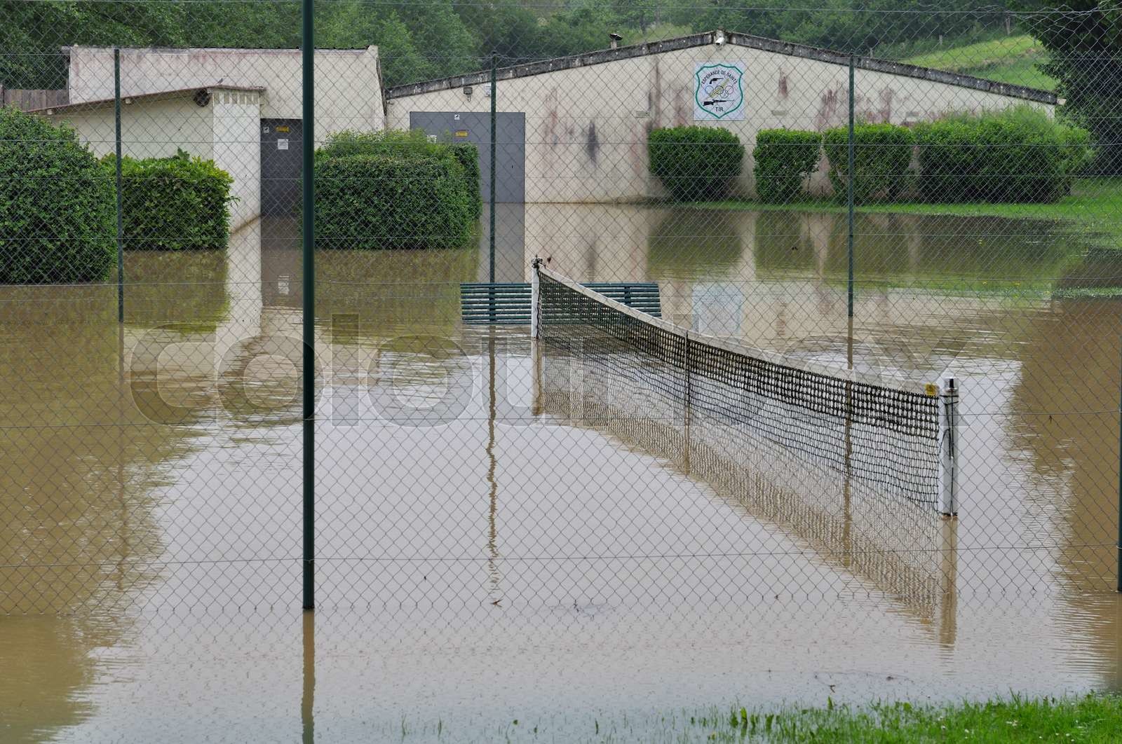 tennis court flooded | Stock image | Colourbox