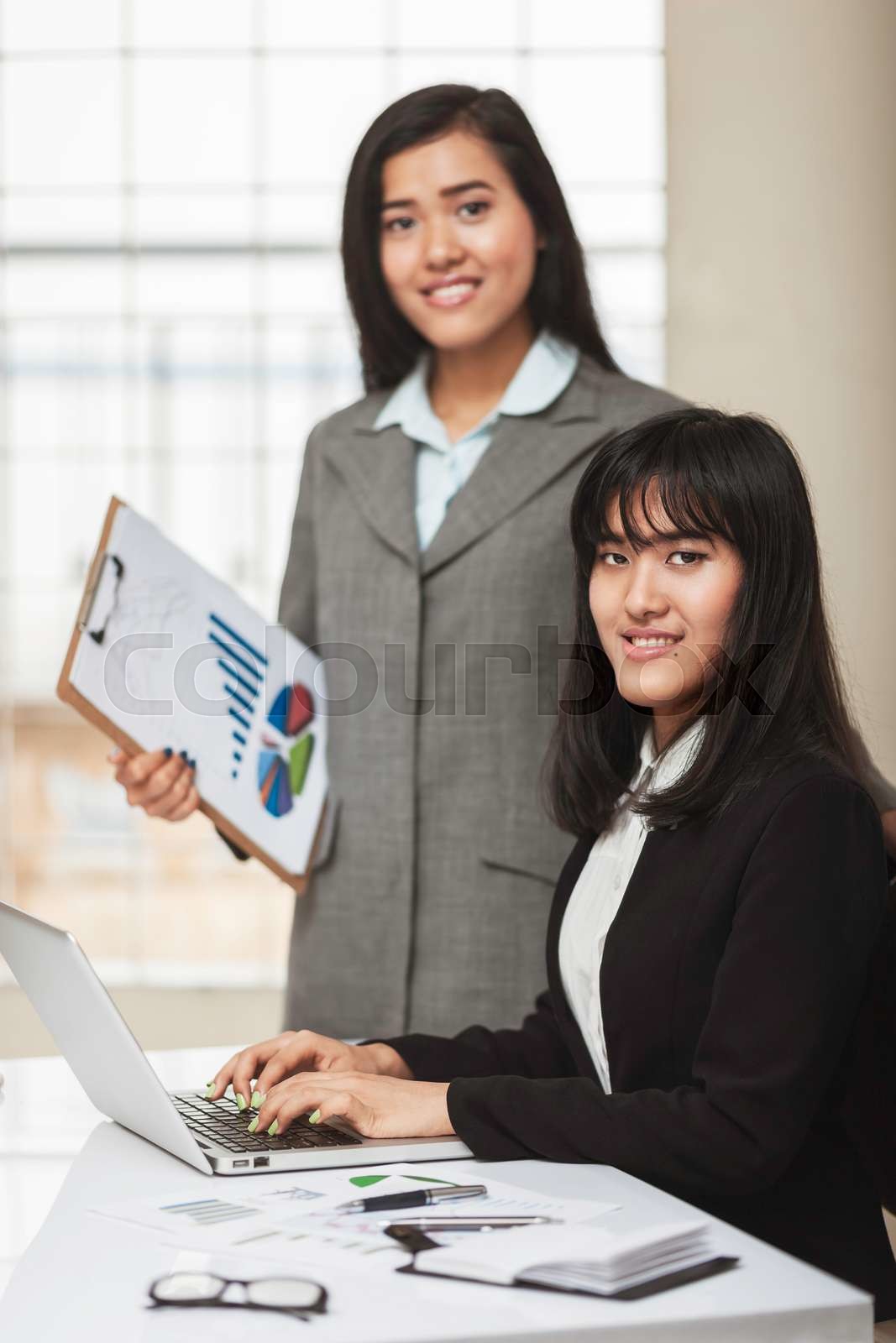 two office employees | Stock image | Colourbox