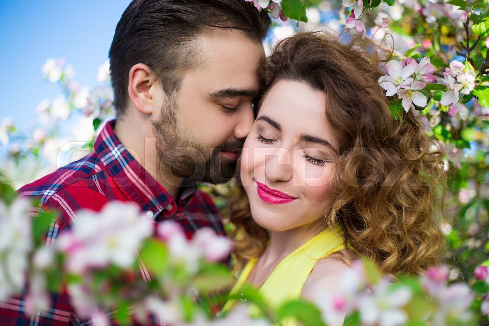 Romantic Couple In Flower Garden