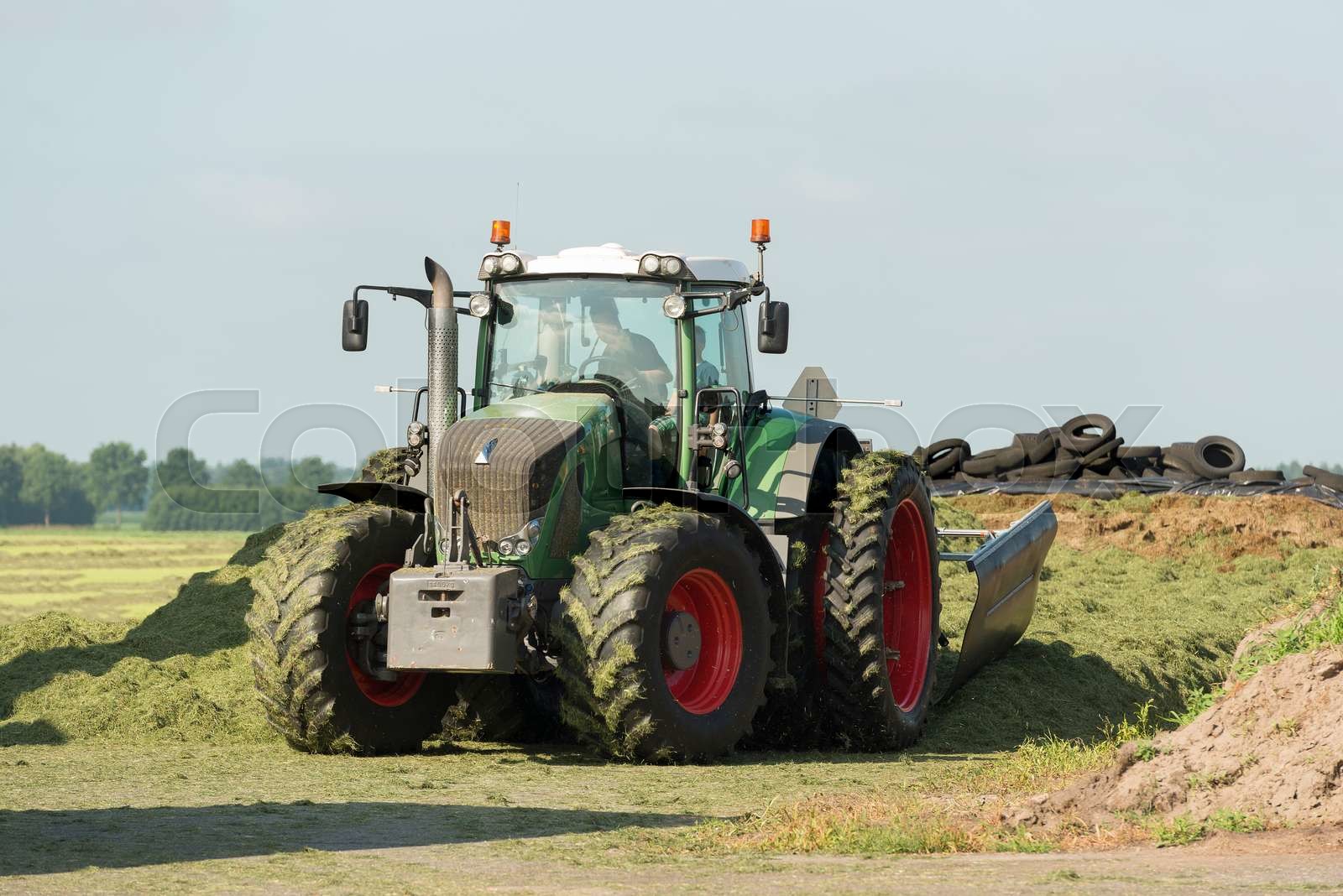 silage with a large tractor | Stock image | Colourbox