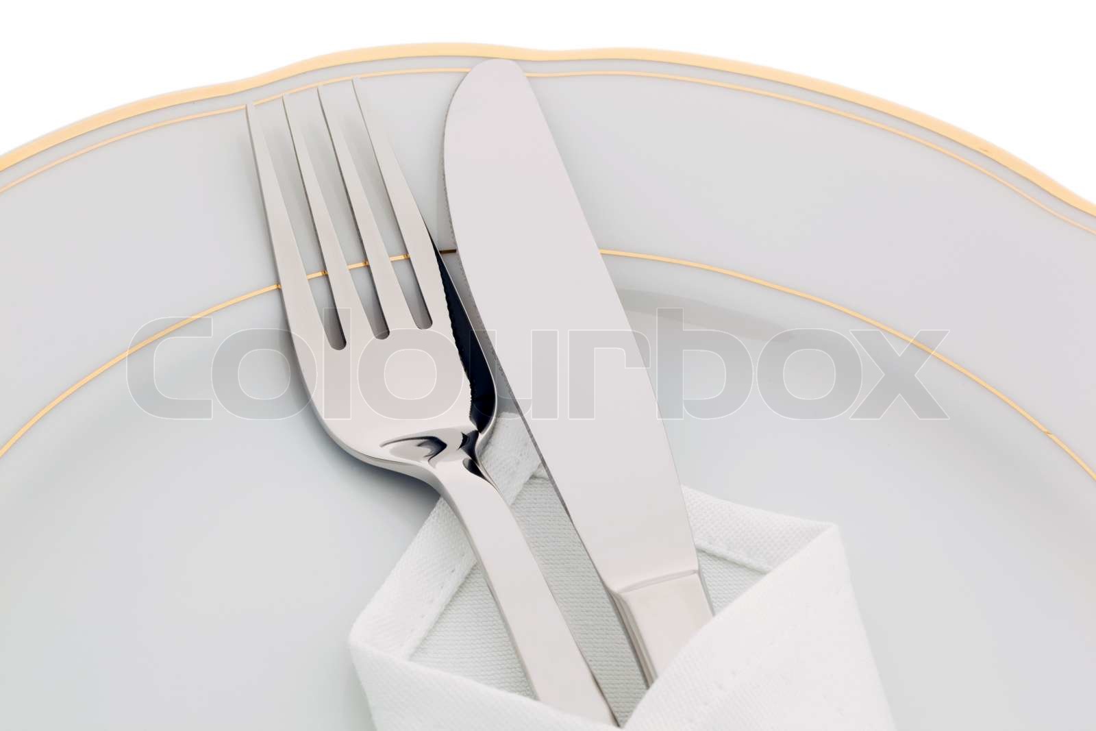 Ein Messer mit einer Gabel und Teller. | Stock Bild | Colourbox