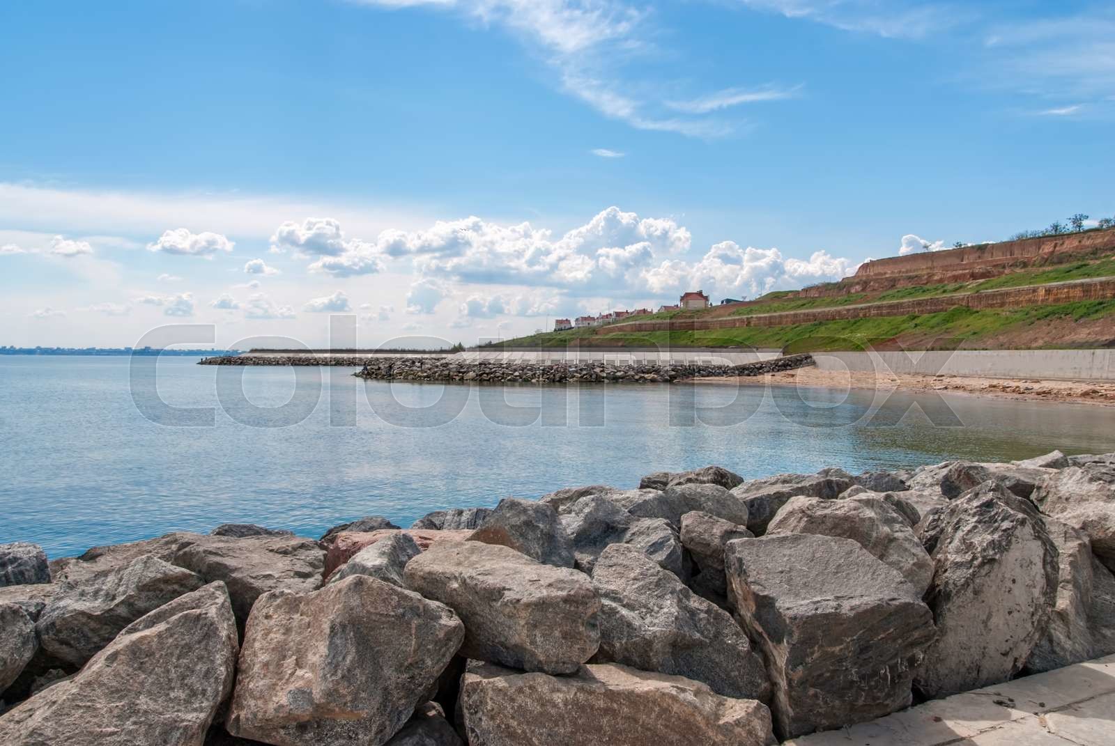 Massive stone breakwater along coast | Stock image | Colourbox