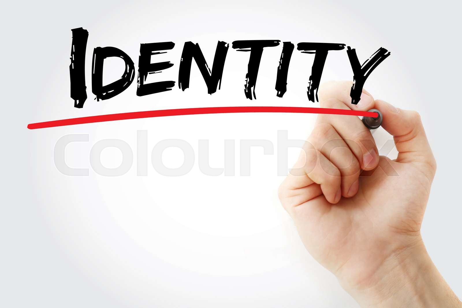 Hand writing Identity with marker | Stock image | Colourbox
