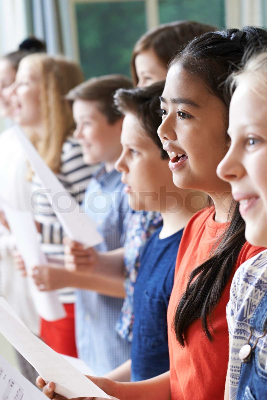 Group Of Children Enjoying Singing Group | Stock image | Colourbox
