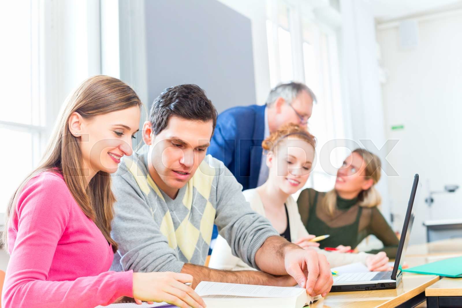 College students lerning with professor | Stock image | Colourbox