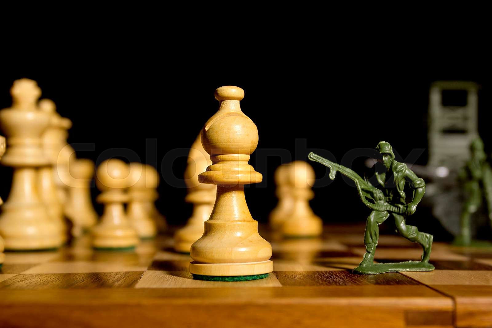 Chess pieces and toy soldiers | Stock image | Colourbox