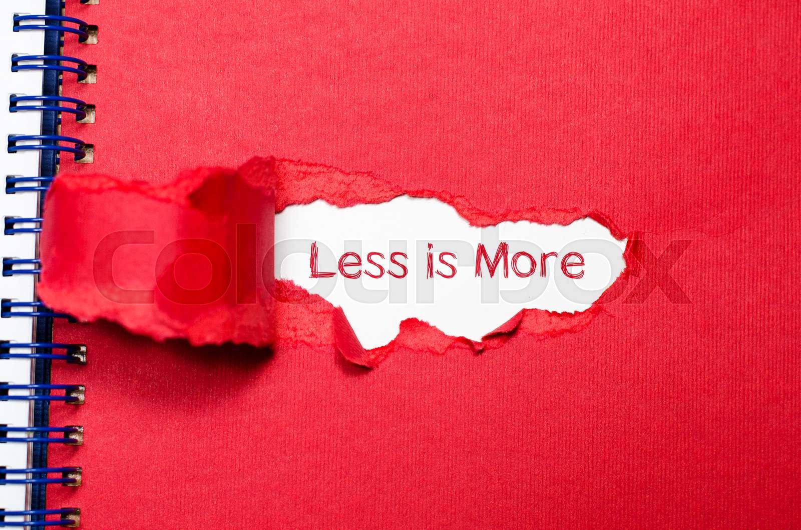 The word less is more appearing behind torn paper. | Stock image ...