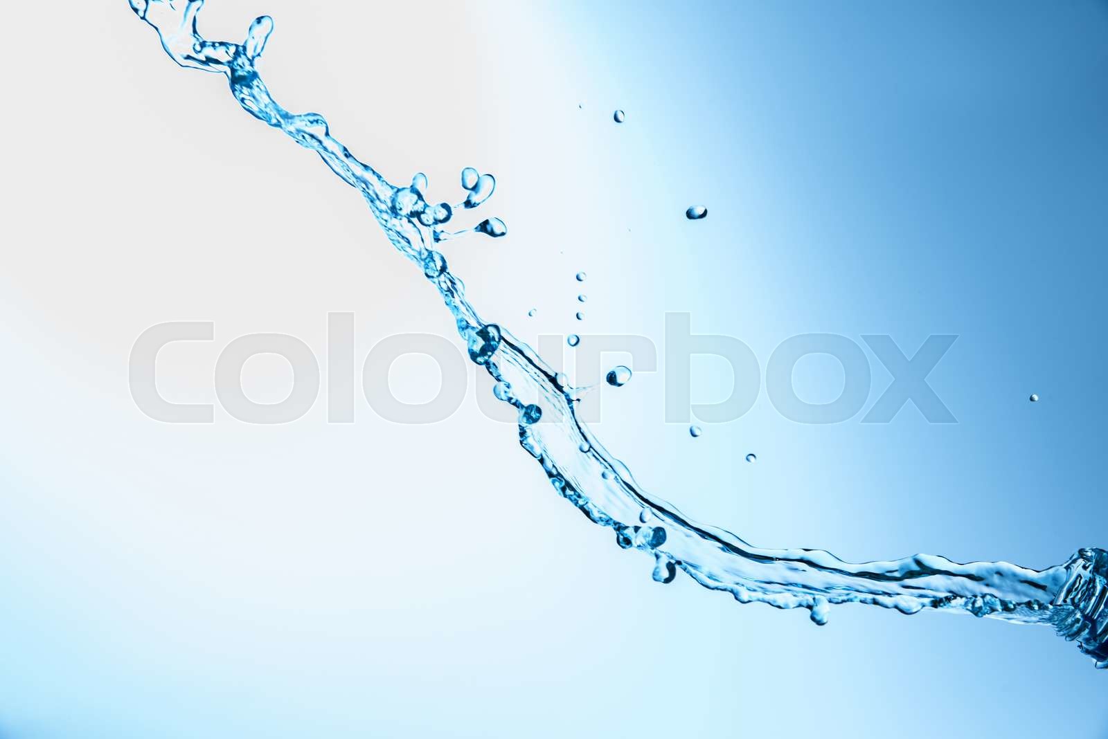 Water splash out of bottle | Stock image | Colourbox