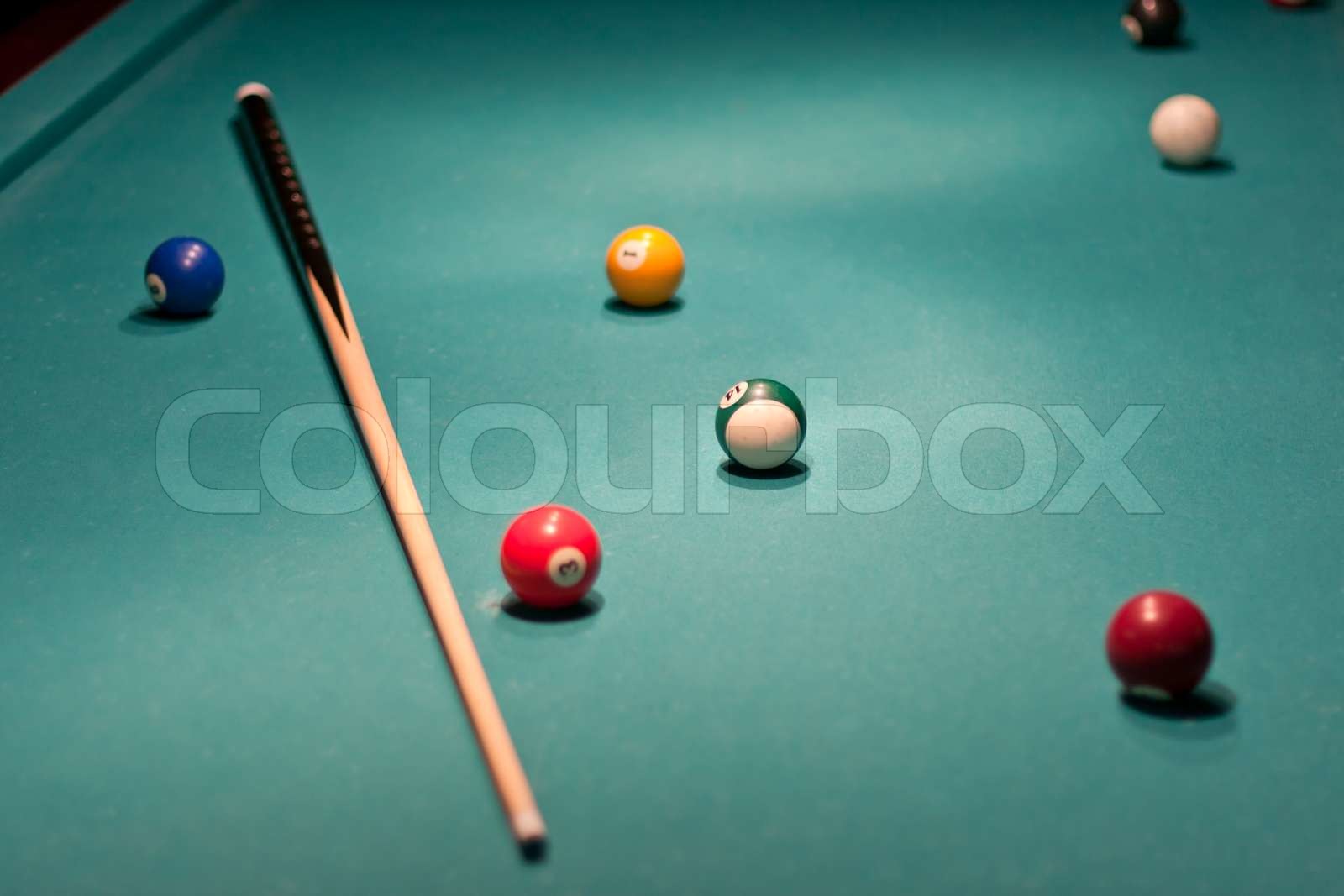 Balls and cue in the American billiards and pool | Stock image | Colourbox