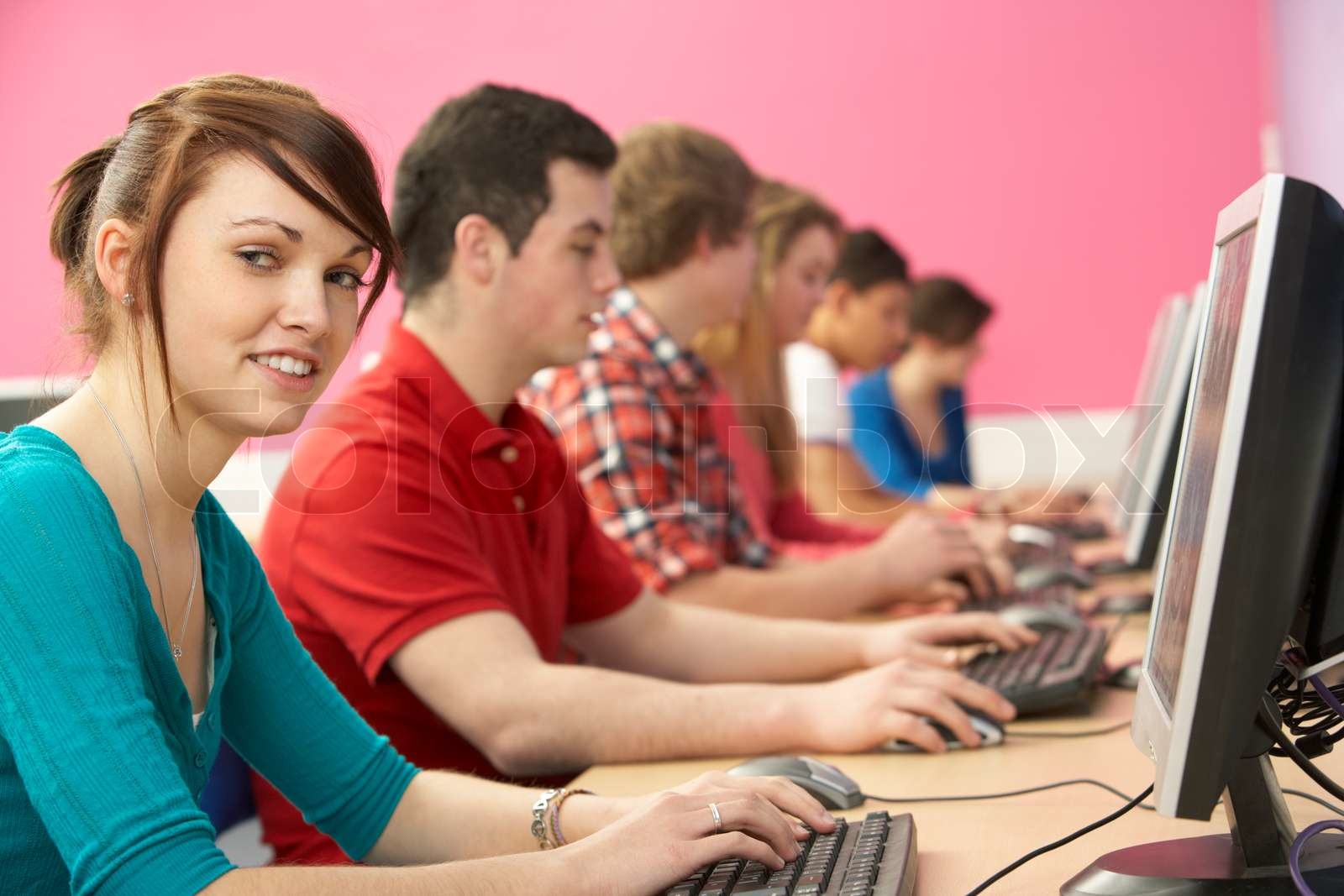 Teenage Students In IT Class Using Computers In Classroom | Stock image ...