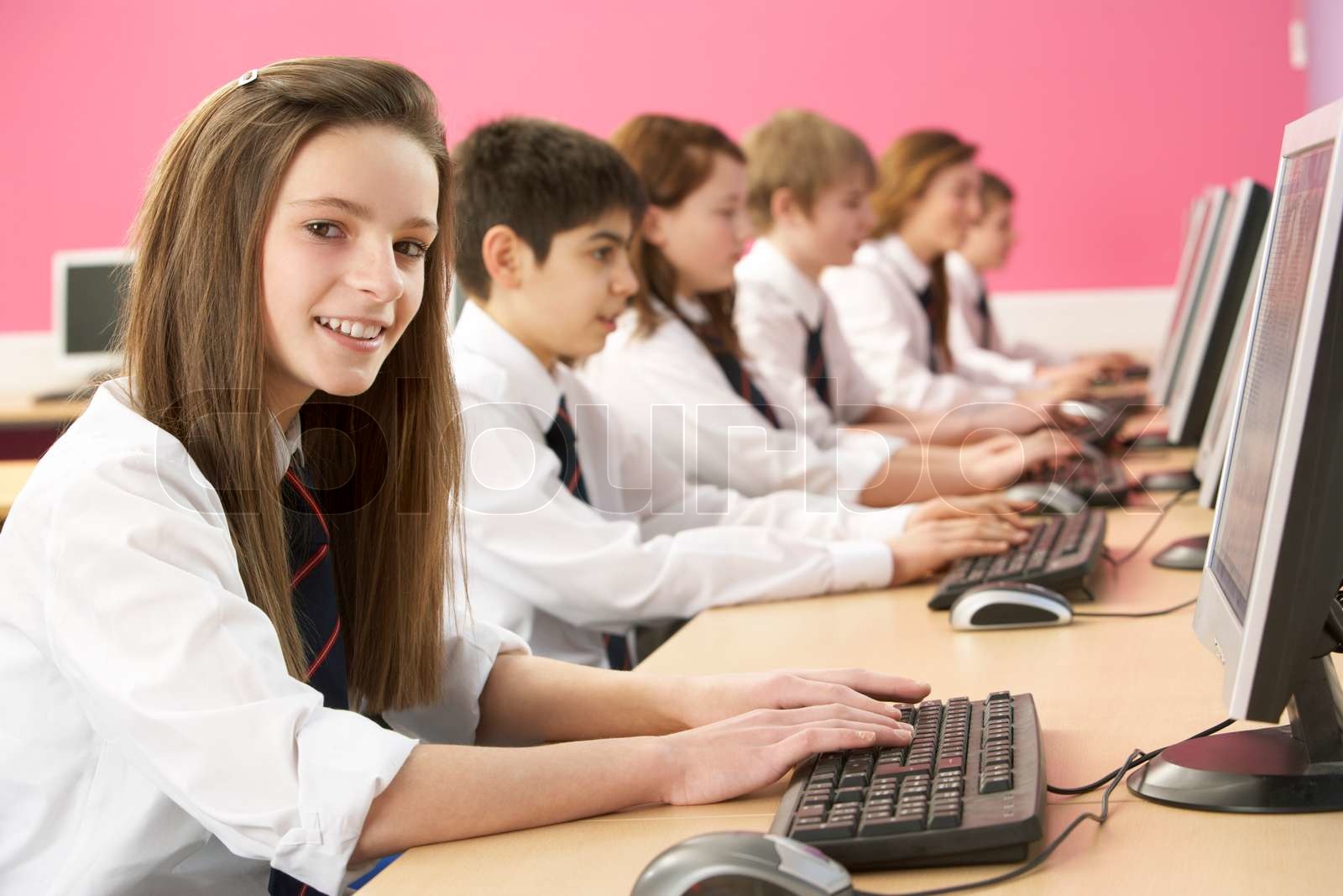 Teenage Students In IT Class Using Computers In Classroom | Stock image ...