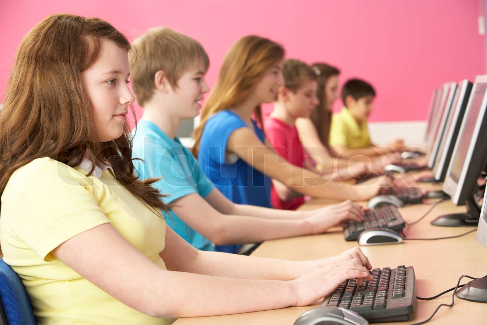 Teenage Students In IT Class Using Computers In Classroom | Stock image ...