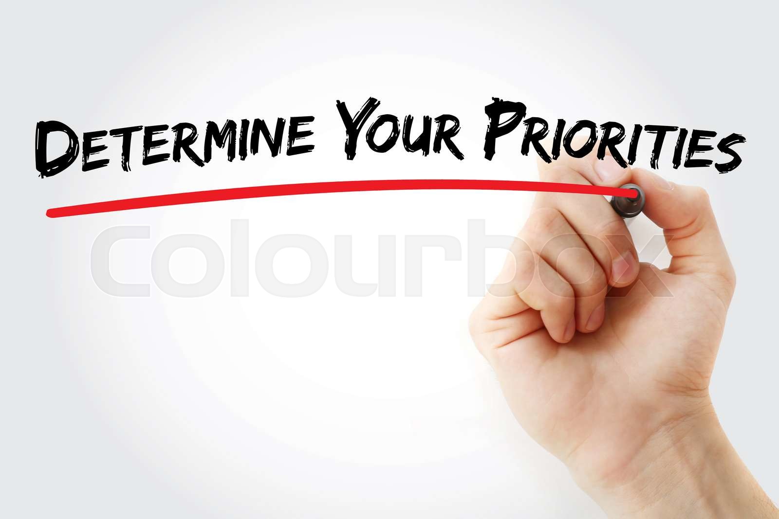 Hand writing Determine your Priorities | Stock image | Colourbox
