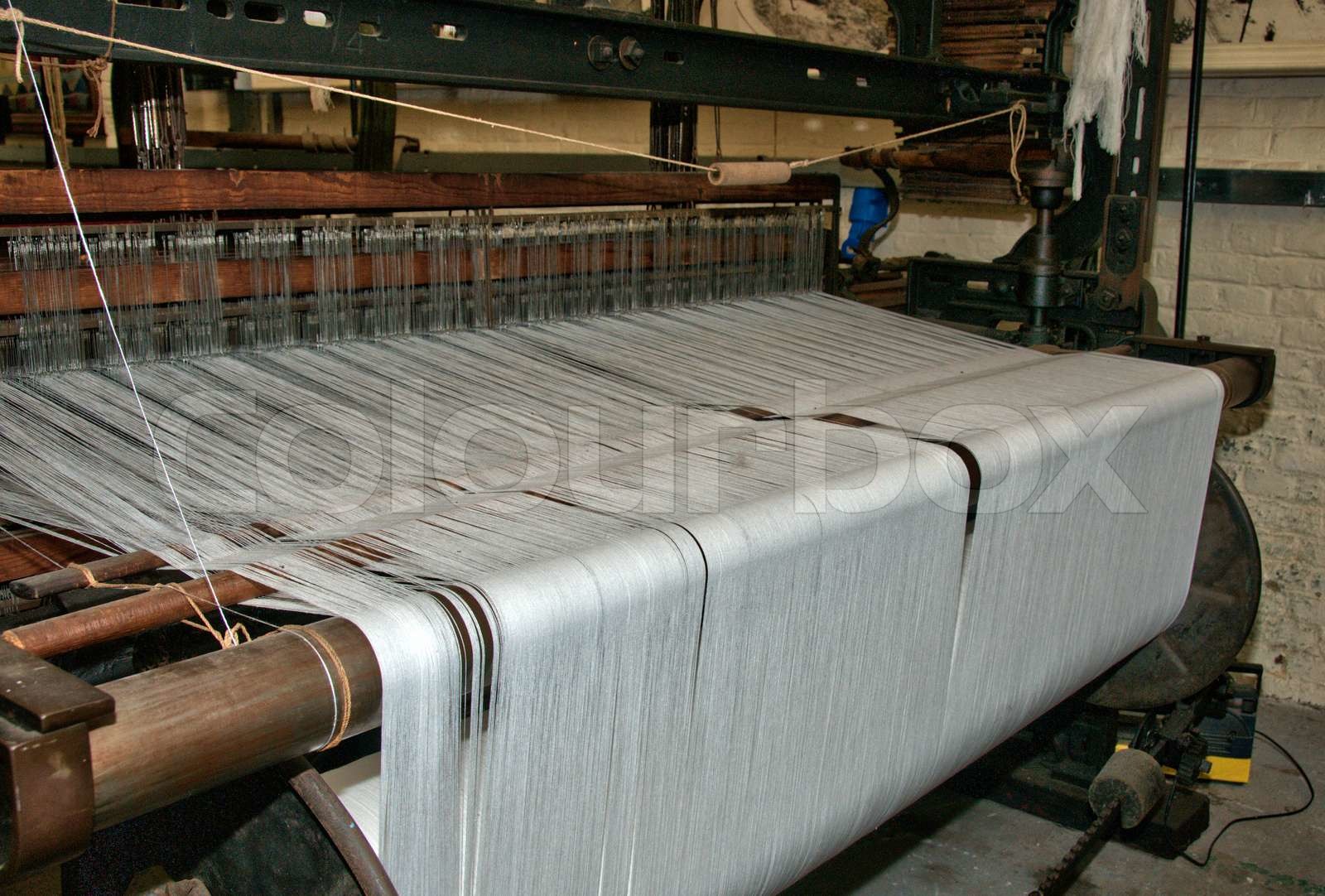 old still working loom for manufacturing clothes | Stock image | Colourbox
