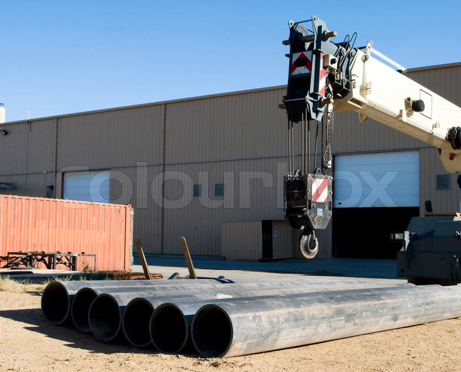 crane and pipe on industrial site | Stock image | Colourbox