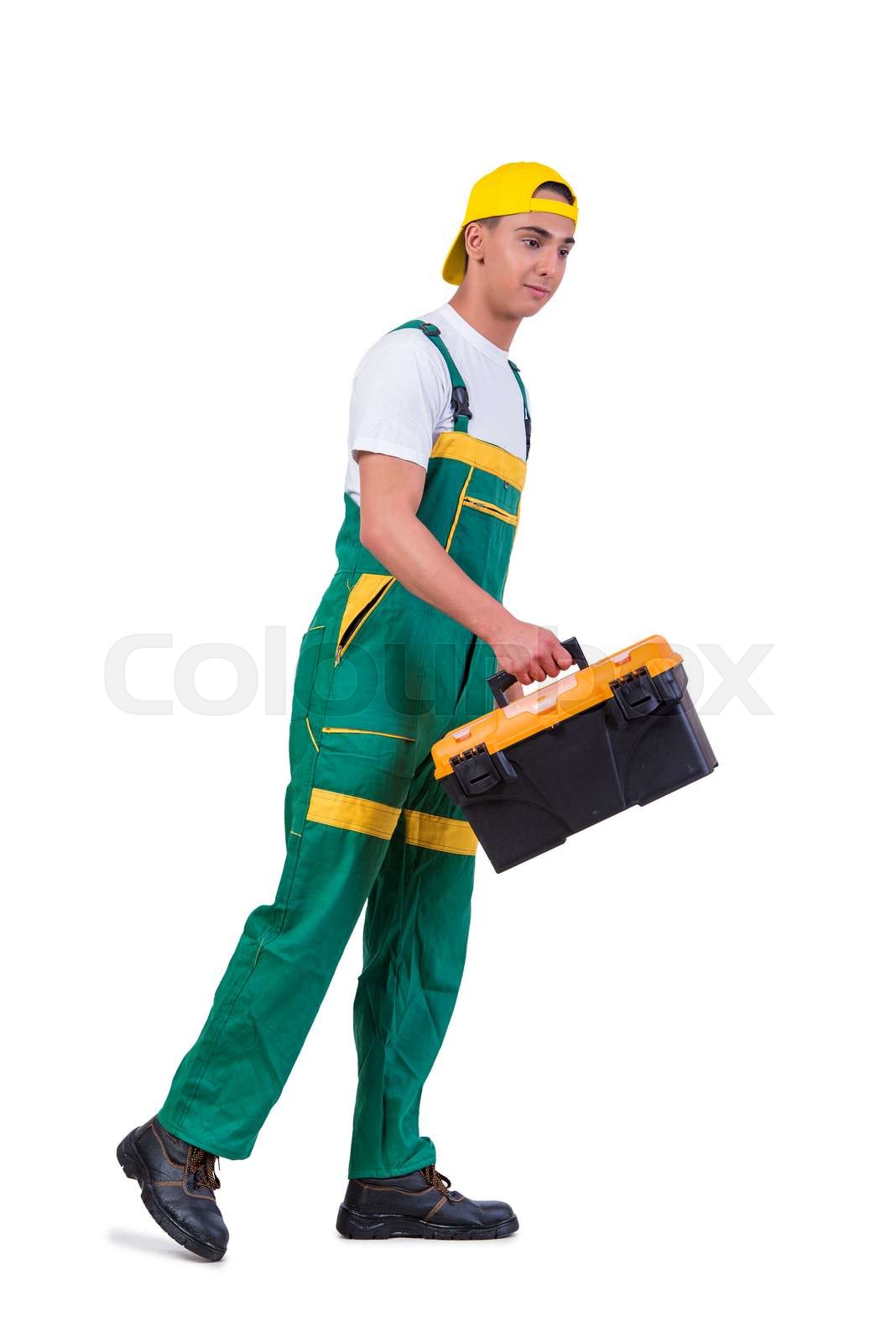 Young man with toolkit toolbox isolated on white | Stock image | Colourbox